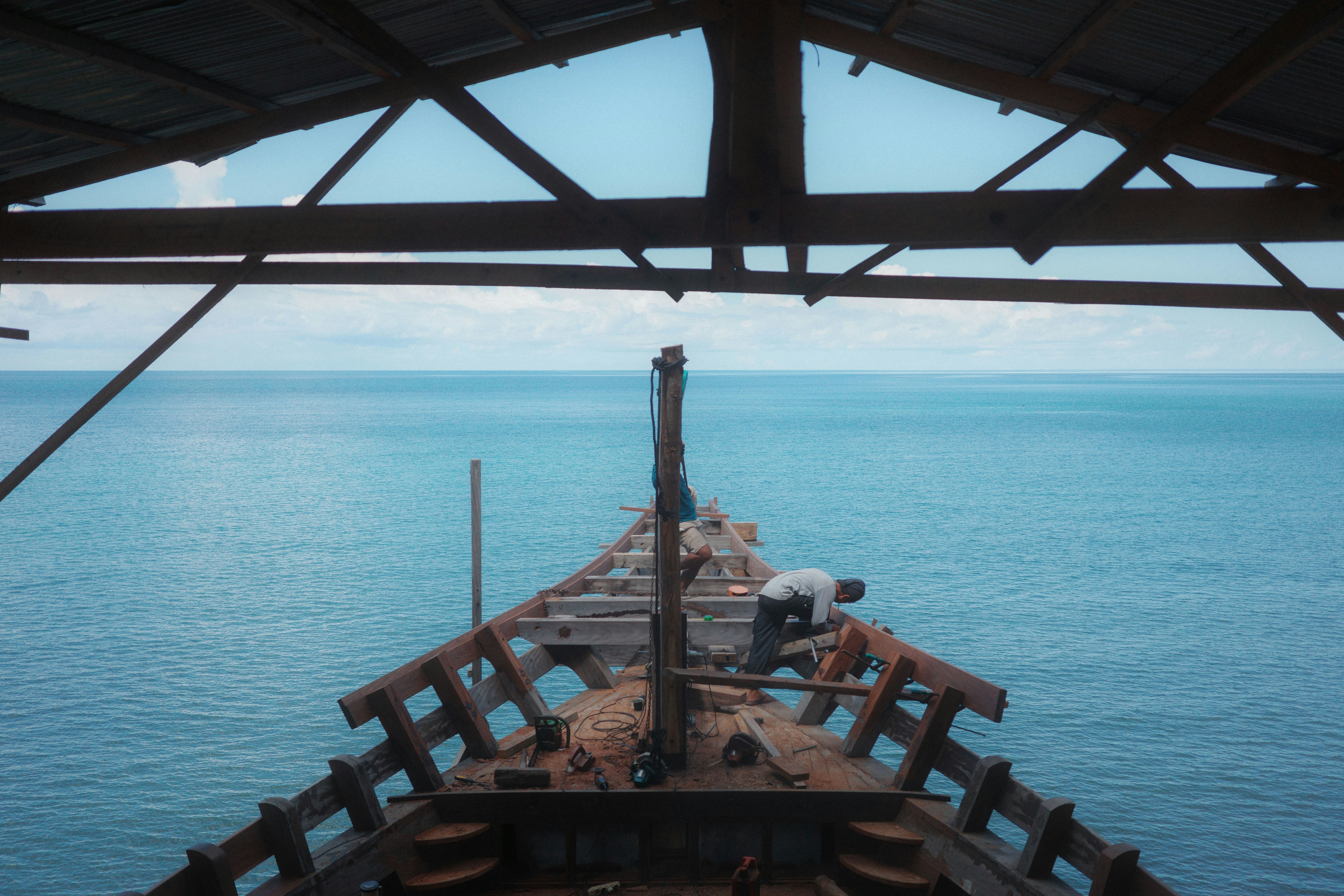 Venture Ahead: The Wooden Pier Reaches the Open Ocean