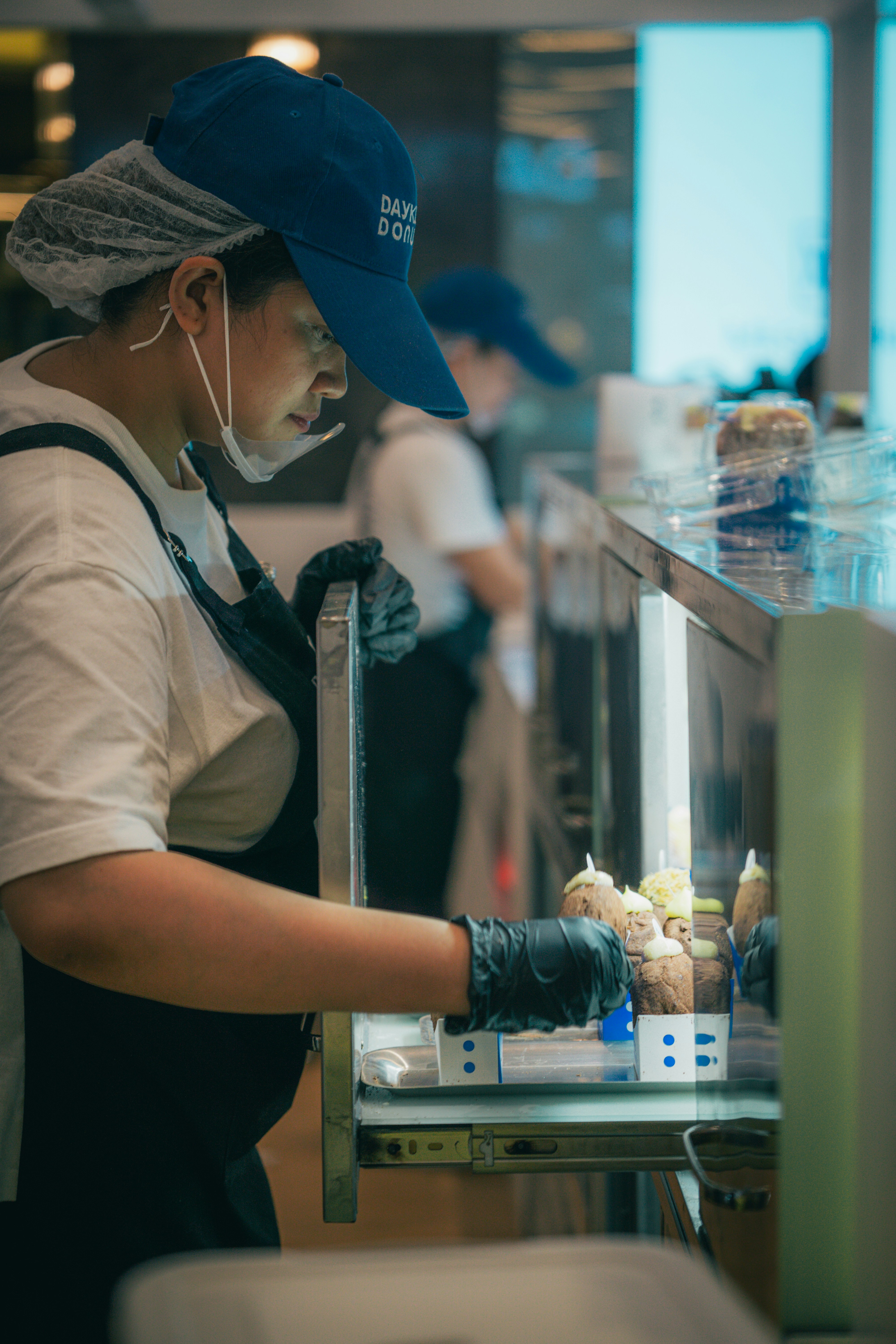 Barista of Frosted Delights: Crafting Ice Cream Confections at Dusk