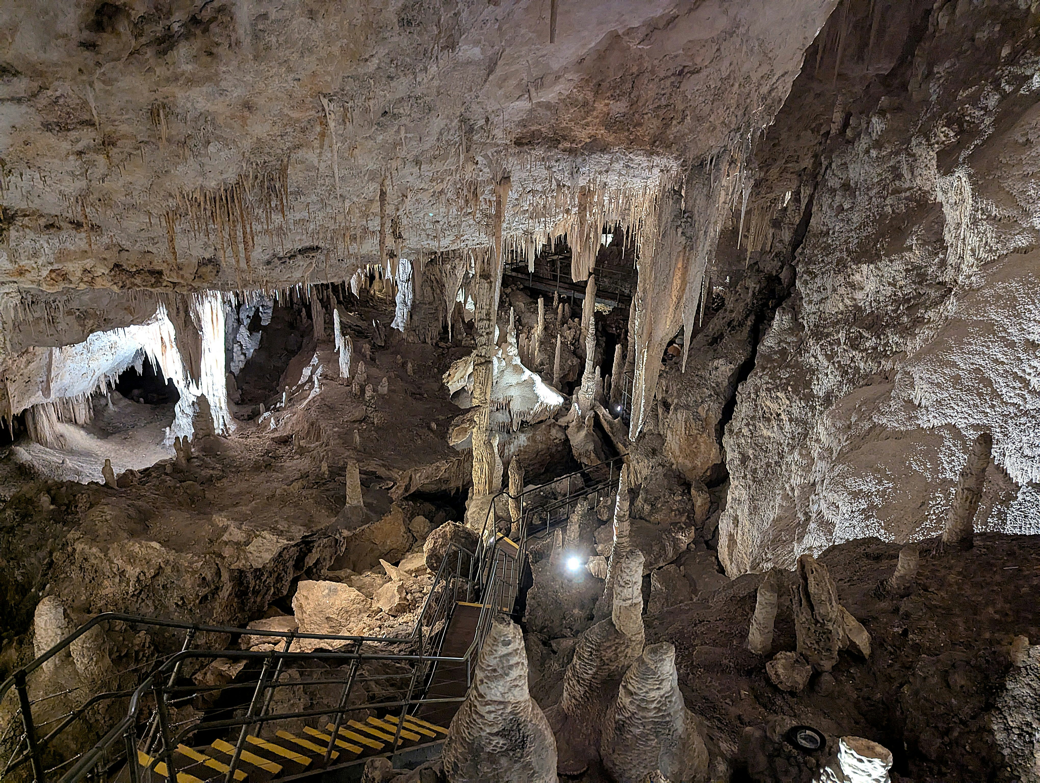 Stalactites and twilight: a cavern tour beneath the ridged ceiling