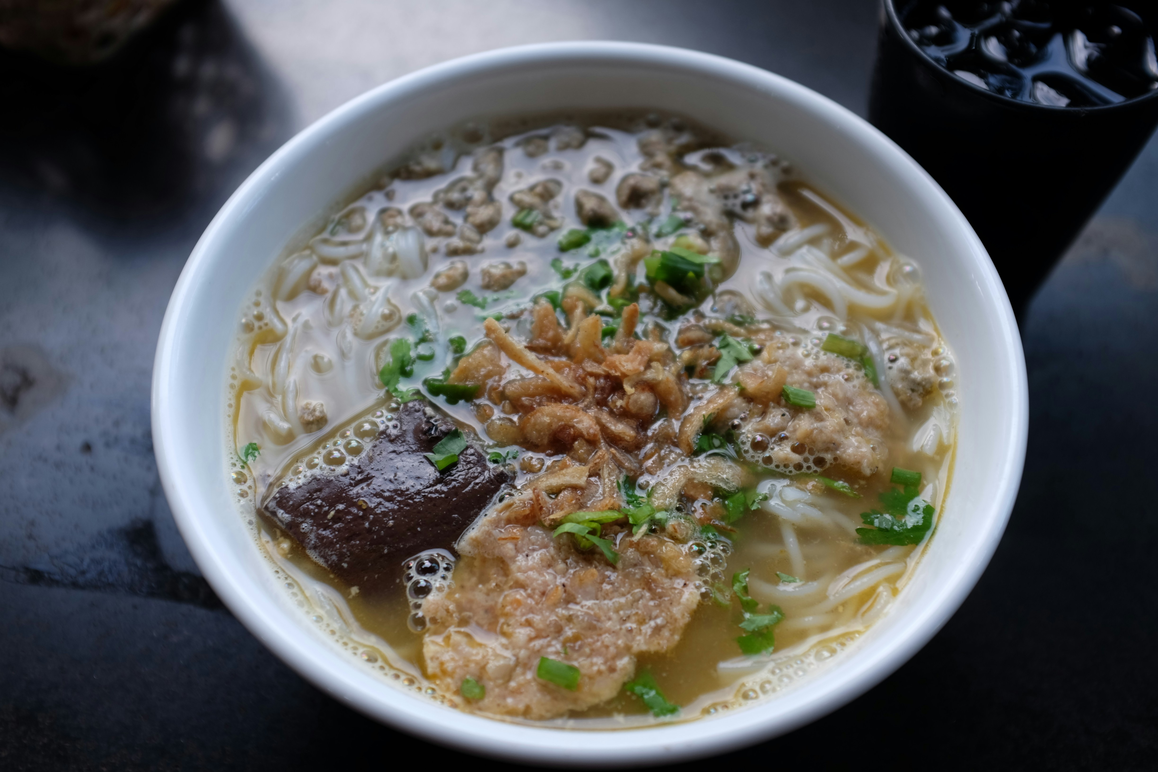Umami in a White Bowl: Noodle Soup with Crispy Toppings