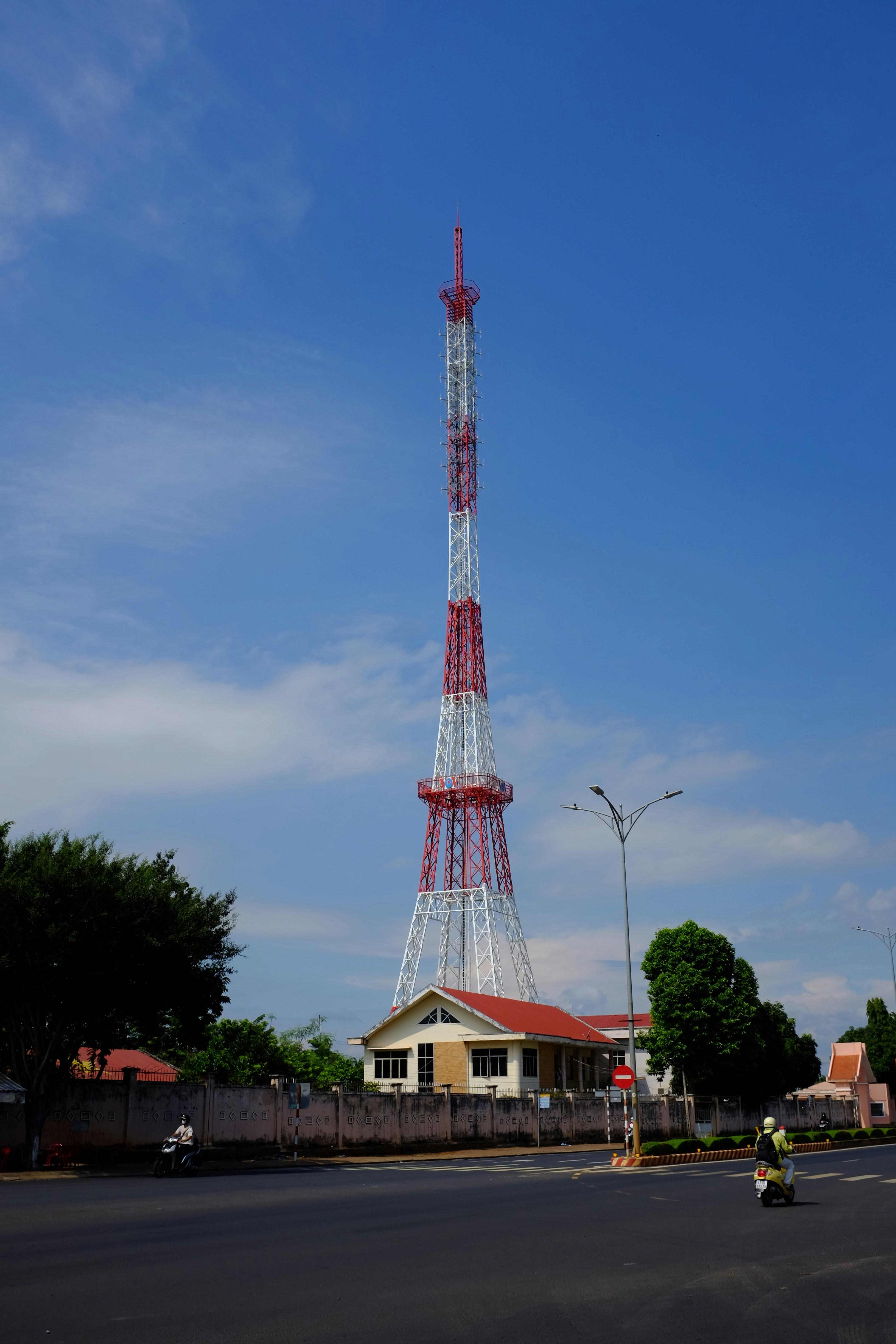 Tower of Red and White Lattice Reaching into the Clear Sky