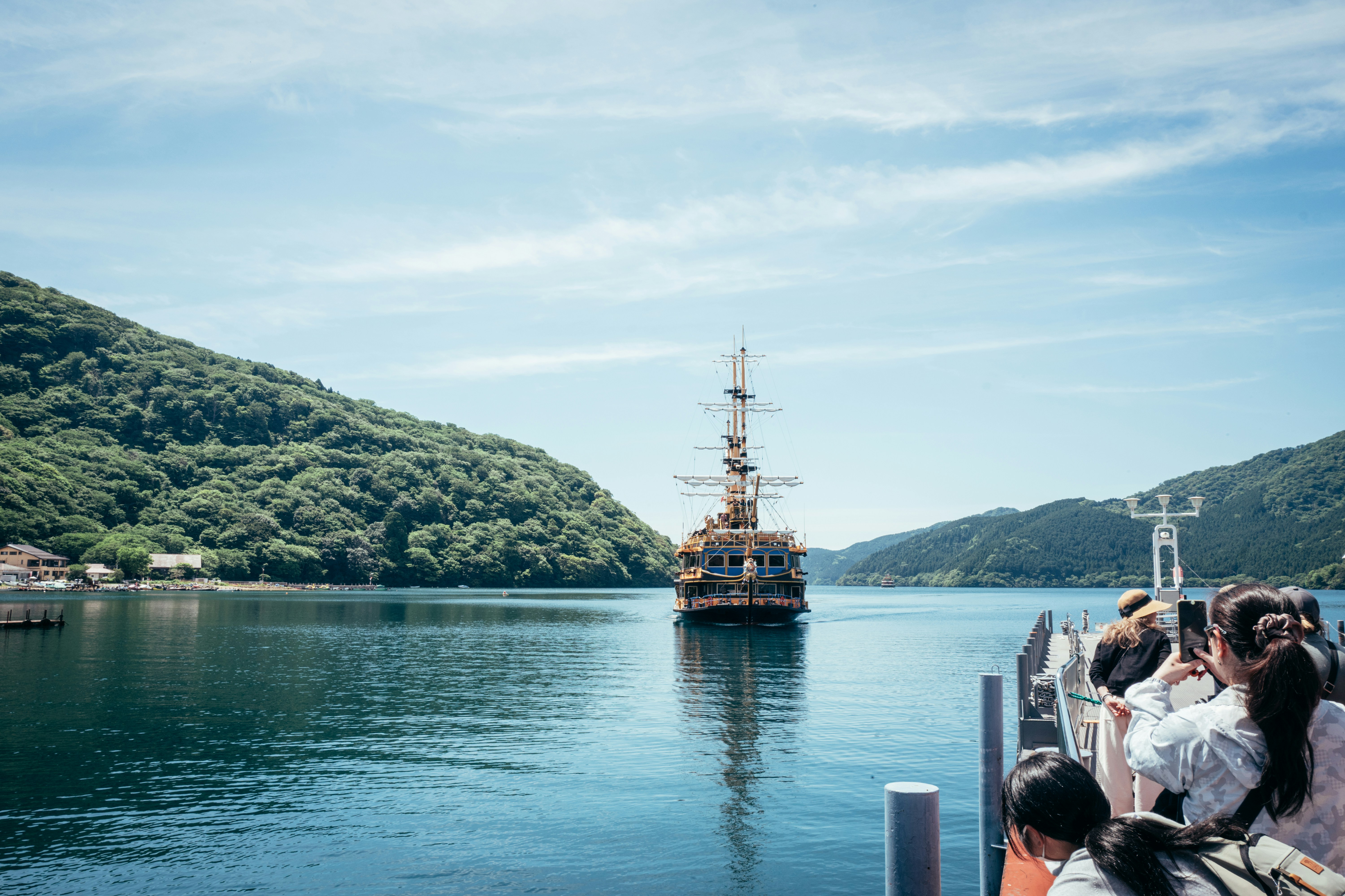 Tall Ship at Calm Fjord: A Visitor’s Waterfront Portrait