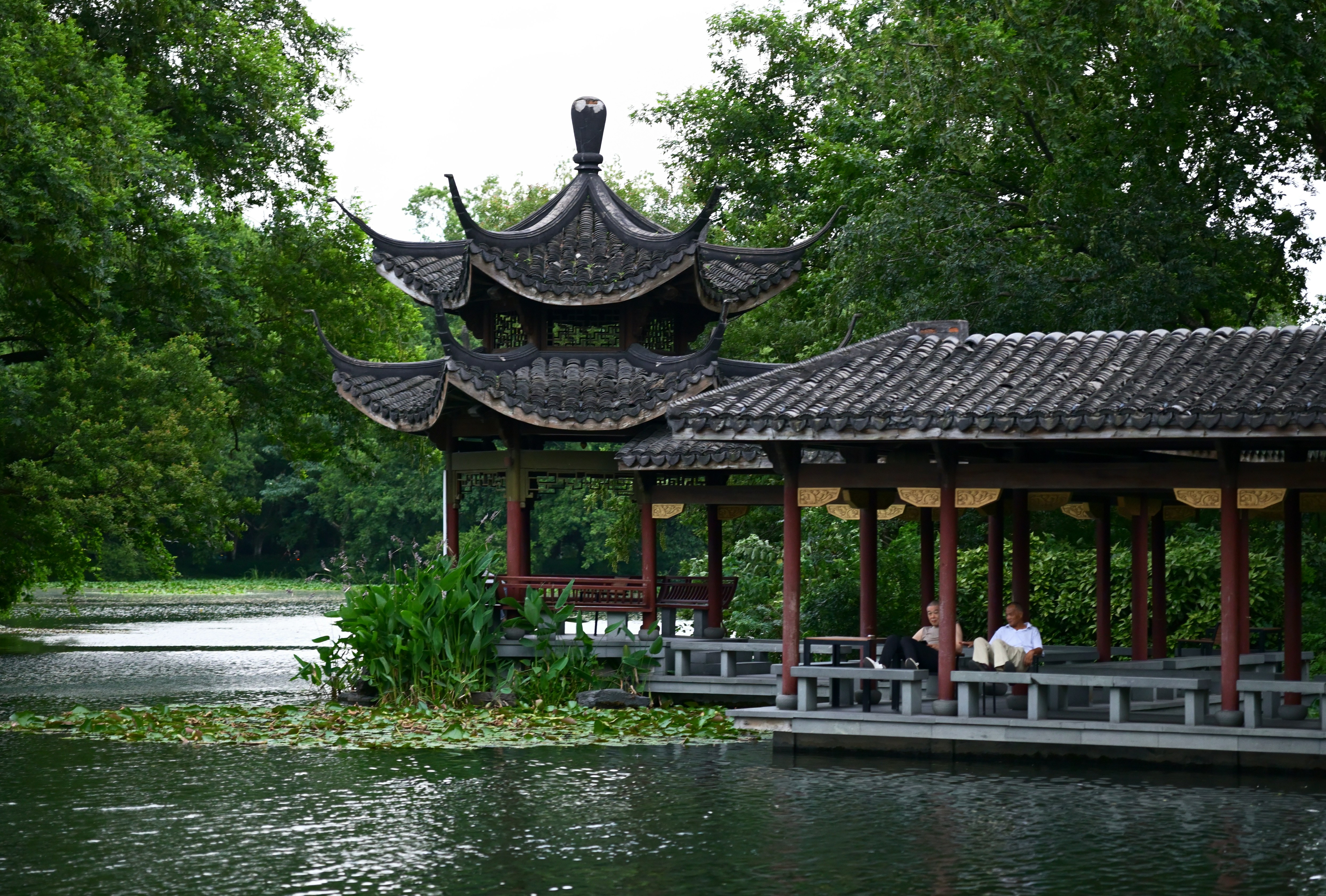 Quiet Pavilion Over the Water: A Serene Moment by the Lake
