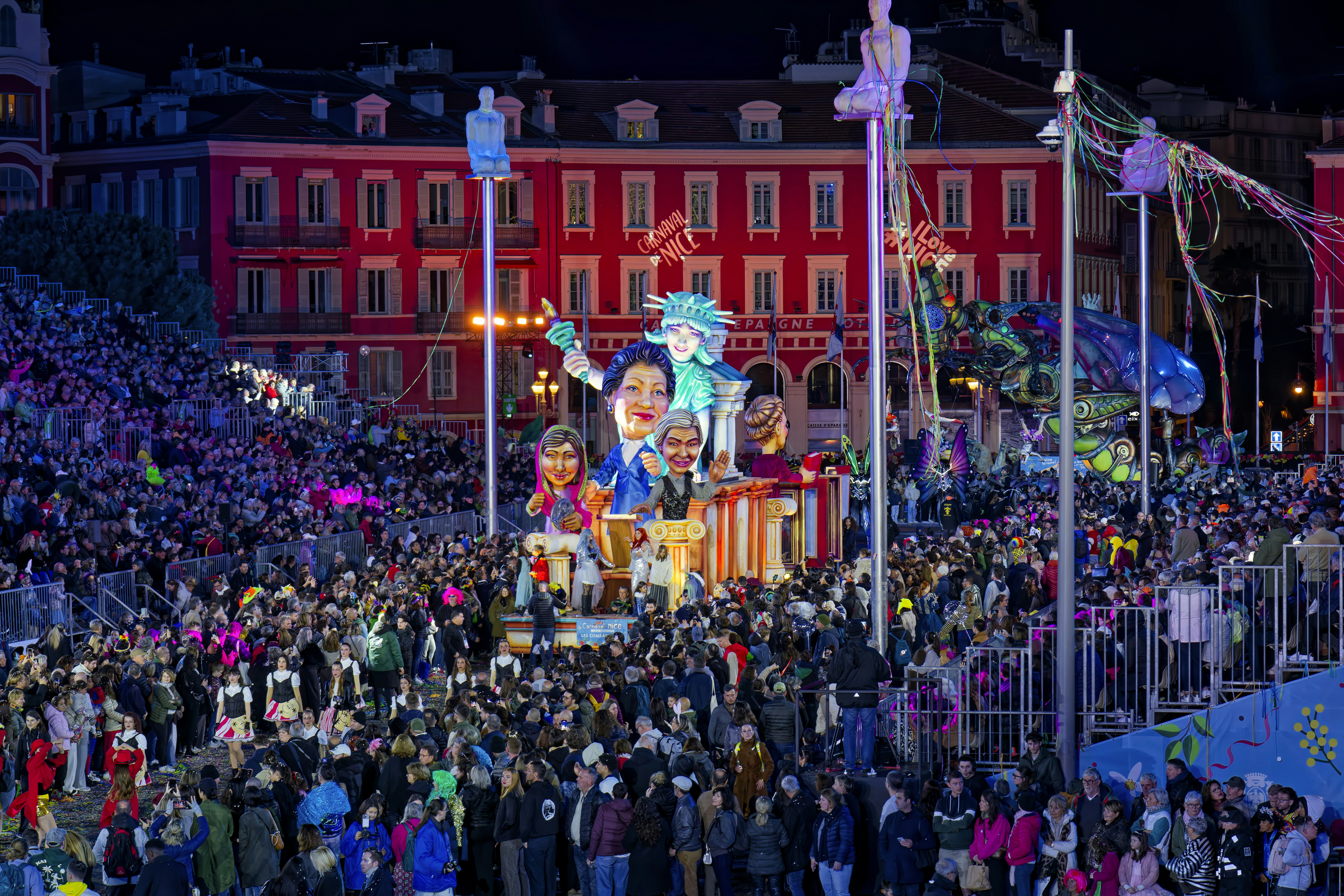 Colorful Carnival Floats Rise Over a Dense Festival Crowd