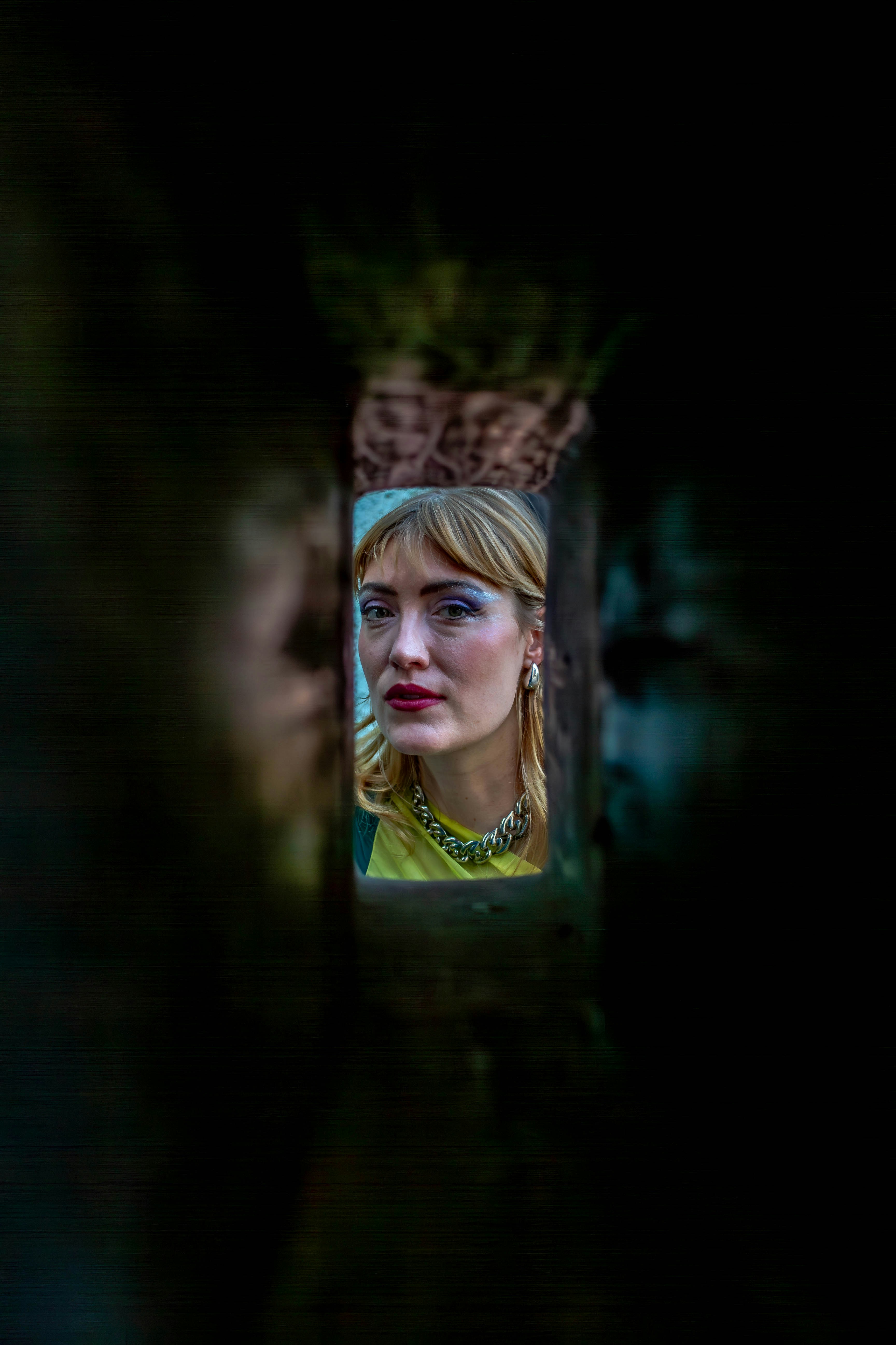 Through a Narrow Vial of Light: Portrait in a Hidden Window