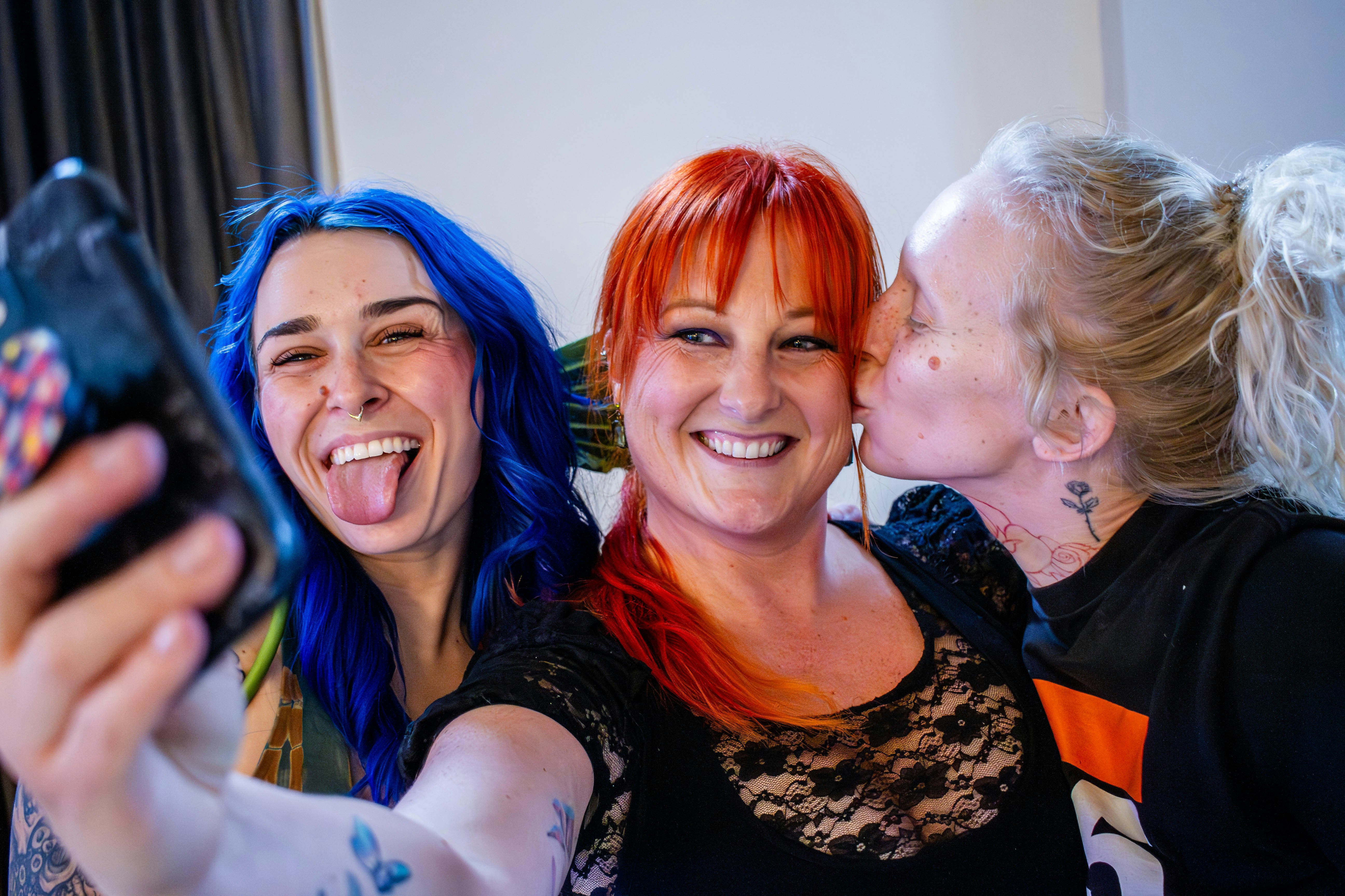 Colorful Trio Spotlight: Selfie Smiles in a Bright Moment