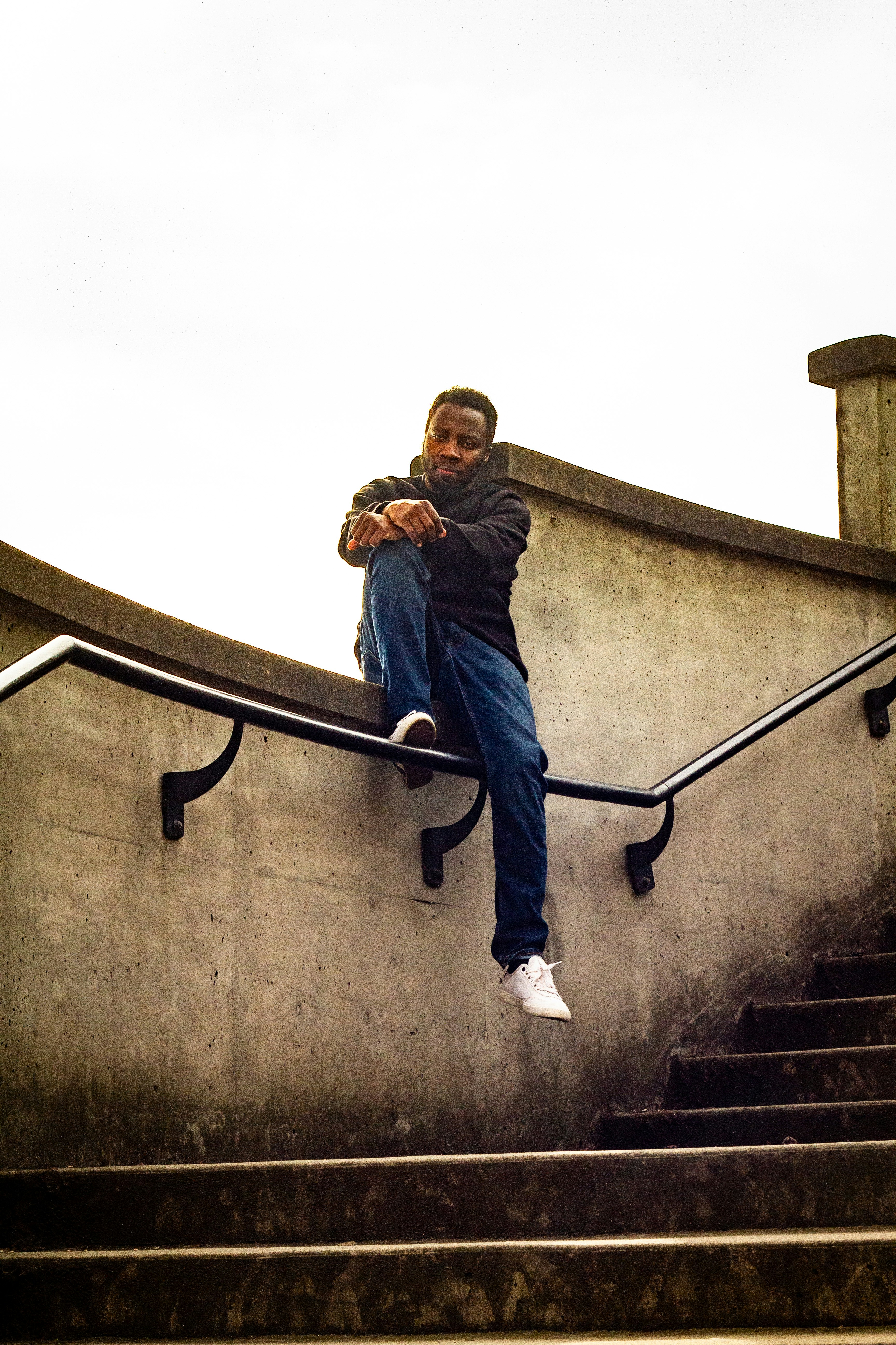 Edge of the Rail: A Moment of Quiet atop the Concrete