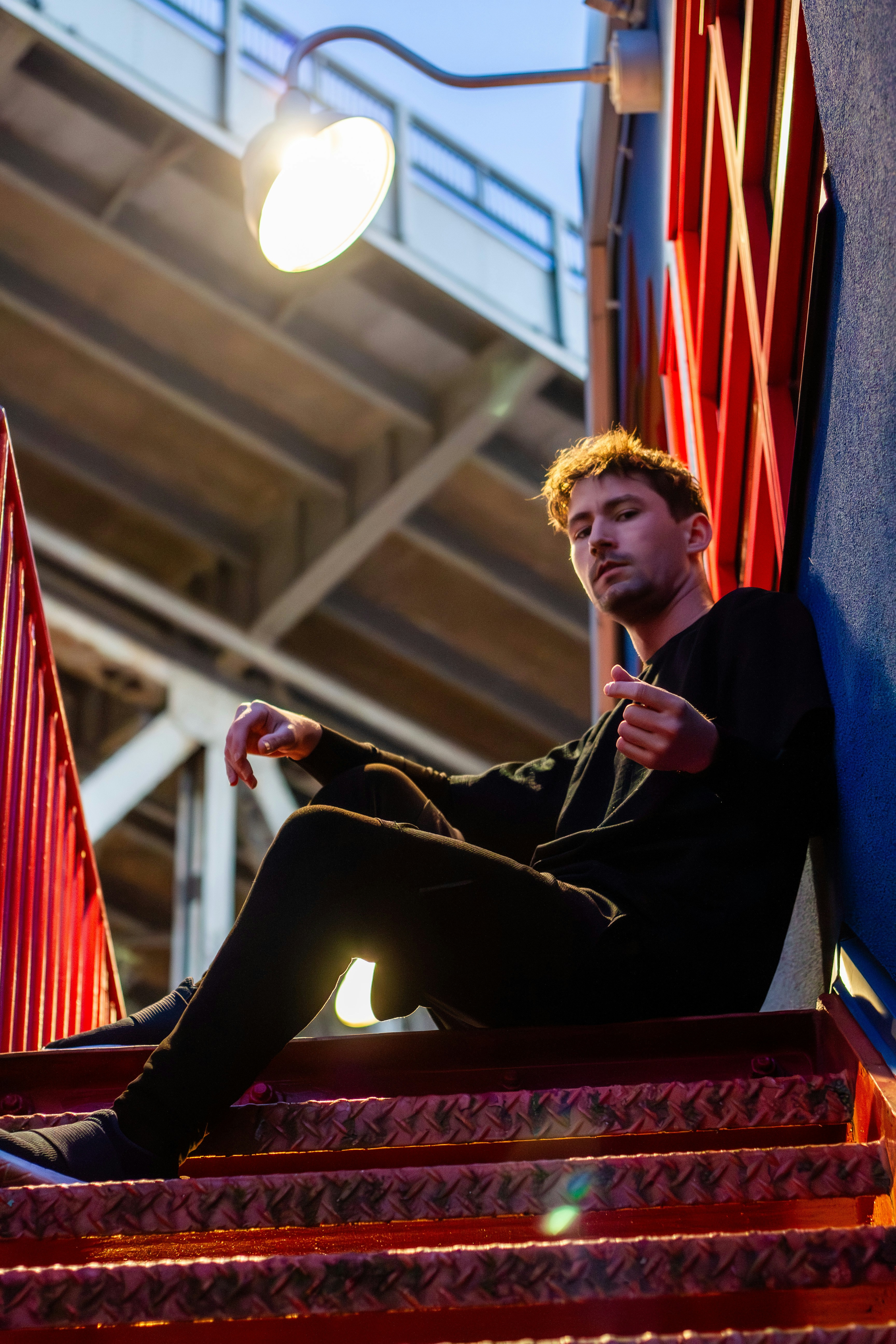 Neon Steps: A Quiet Moment on the Staircase