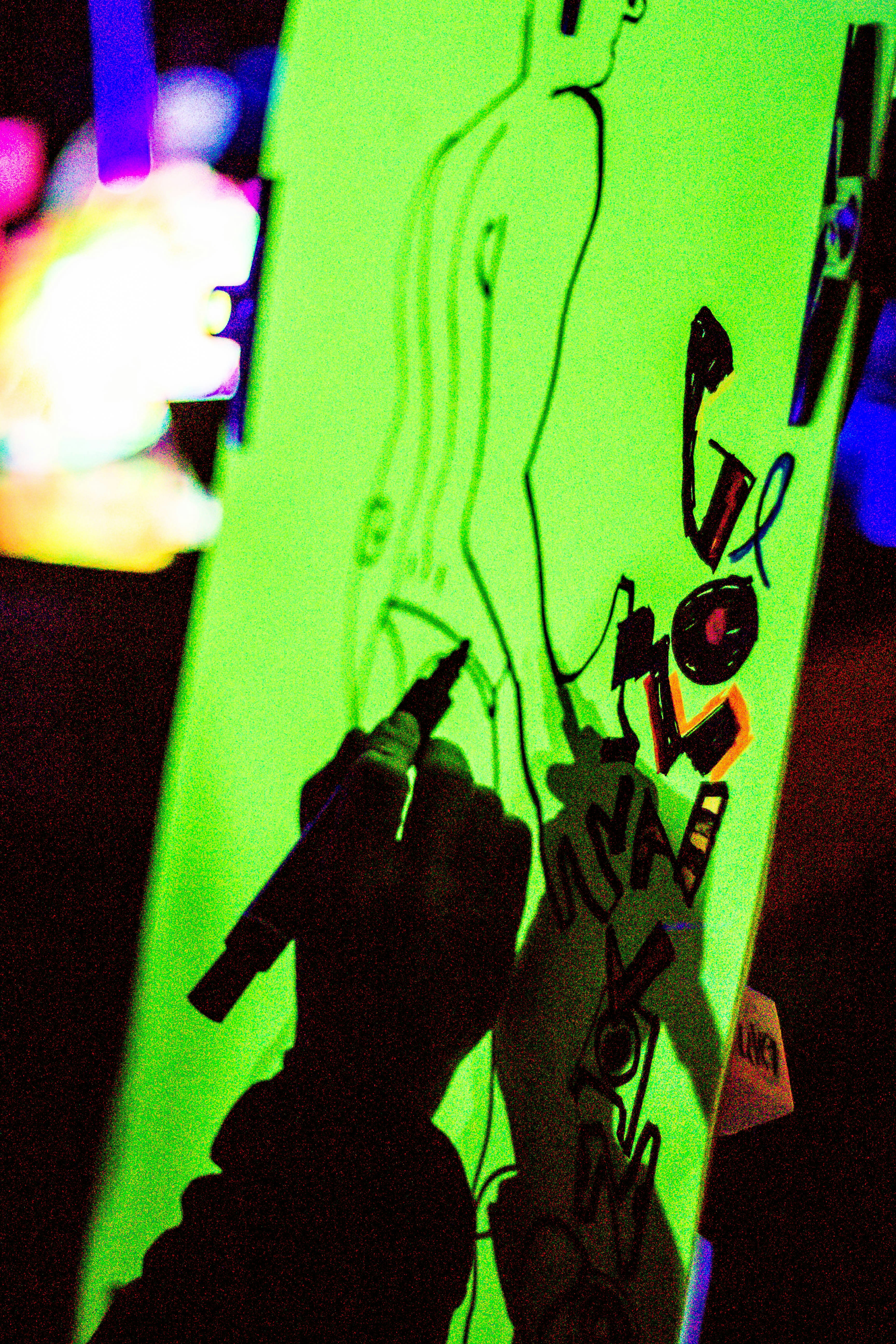 Neon Green Poster in a Night Market