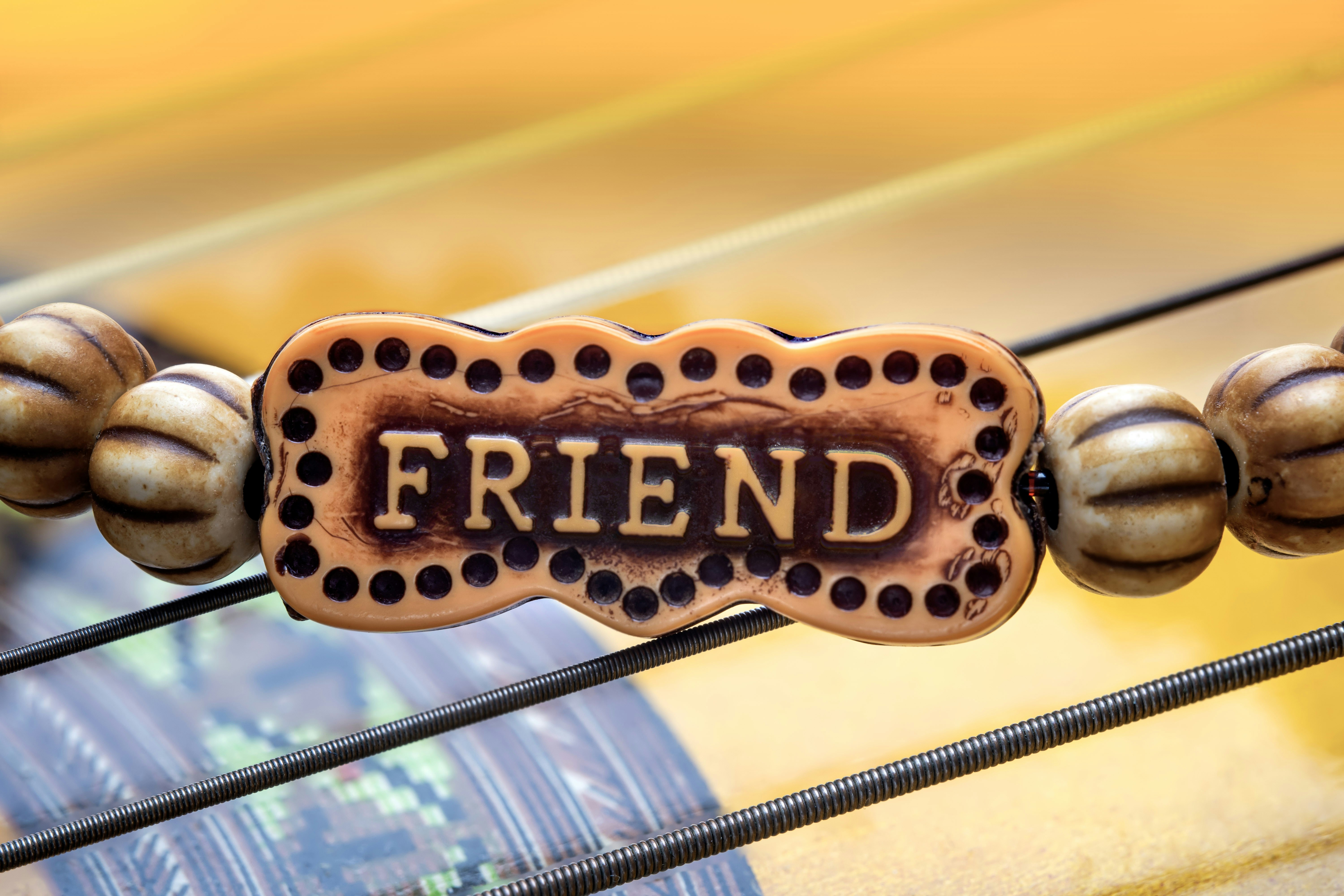 Friendship in Metal: A Leather Tag Amid Wires