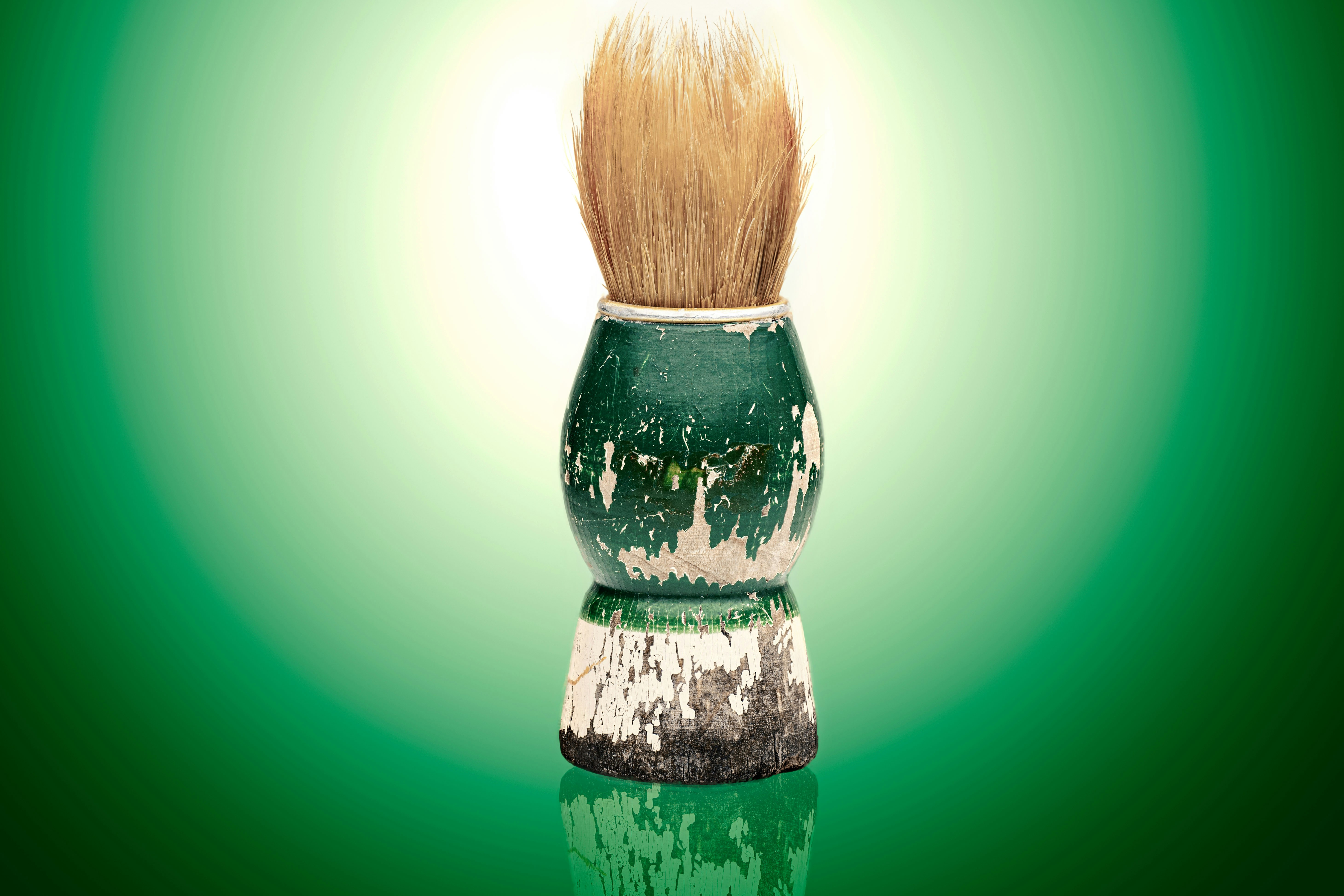 Worn Green Brush on a Vivid Green Stage