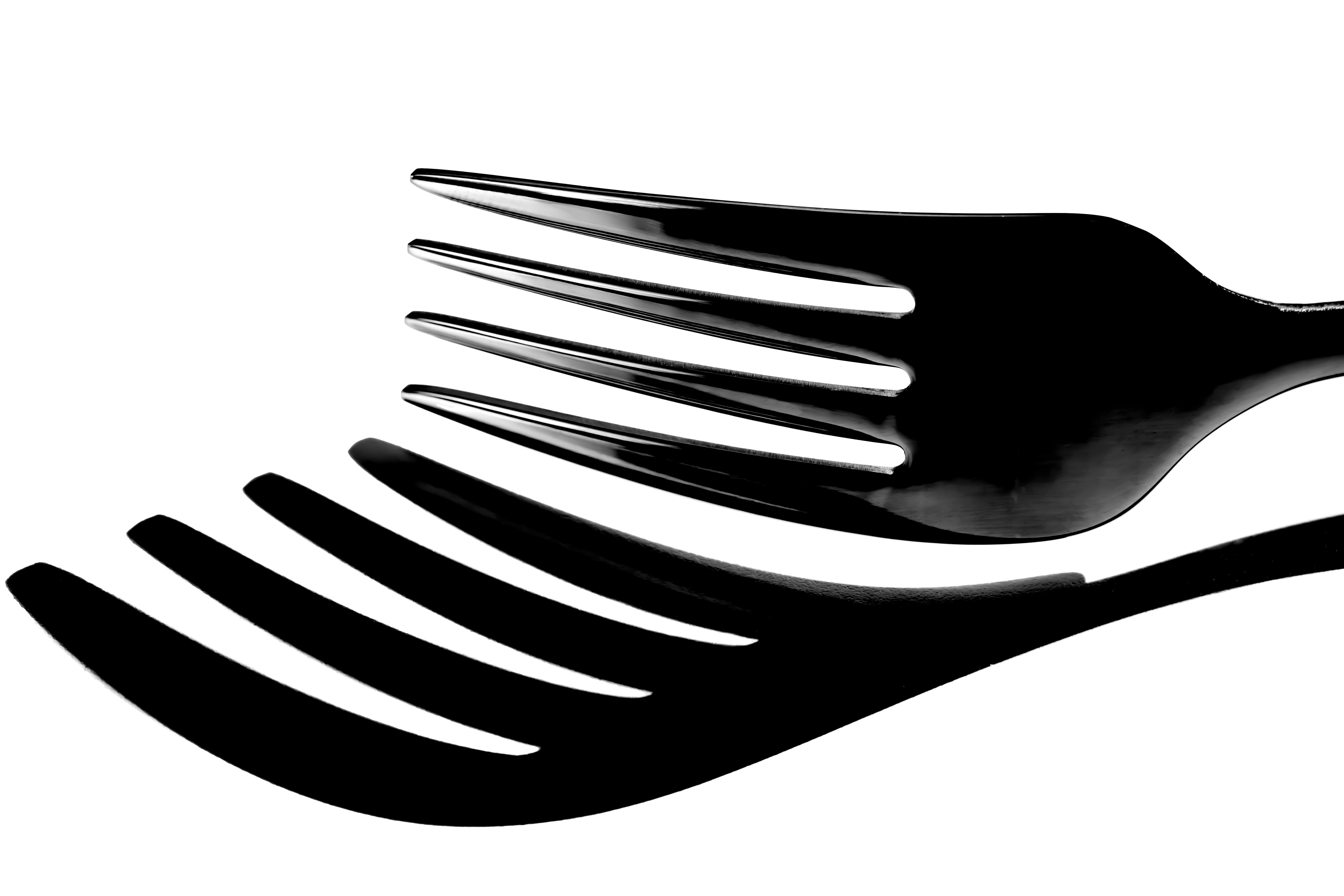 Silhouetted Utensil Duo: A Minimalist Play of Positive and Negative Space