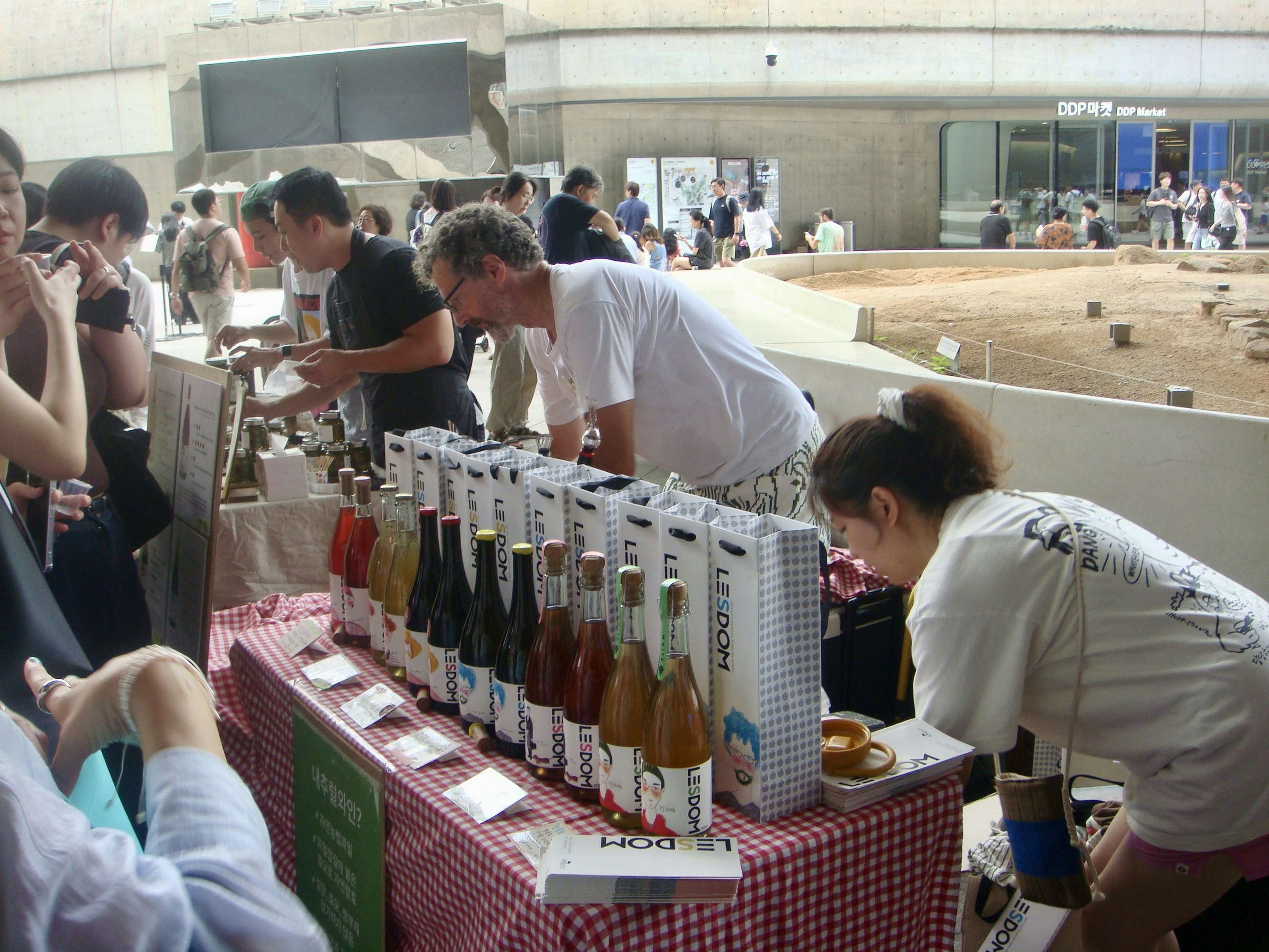 Market Stall Serenade: Bottles and Buzz in an Open-Air Brew