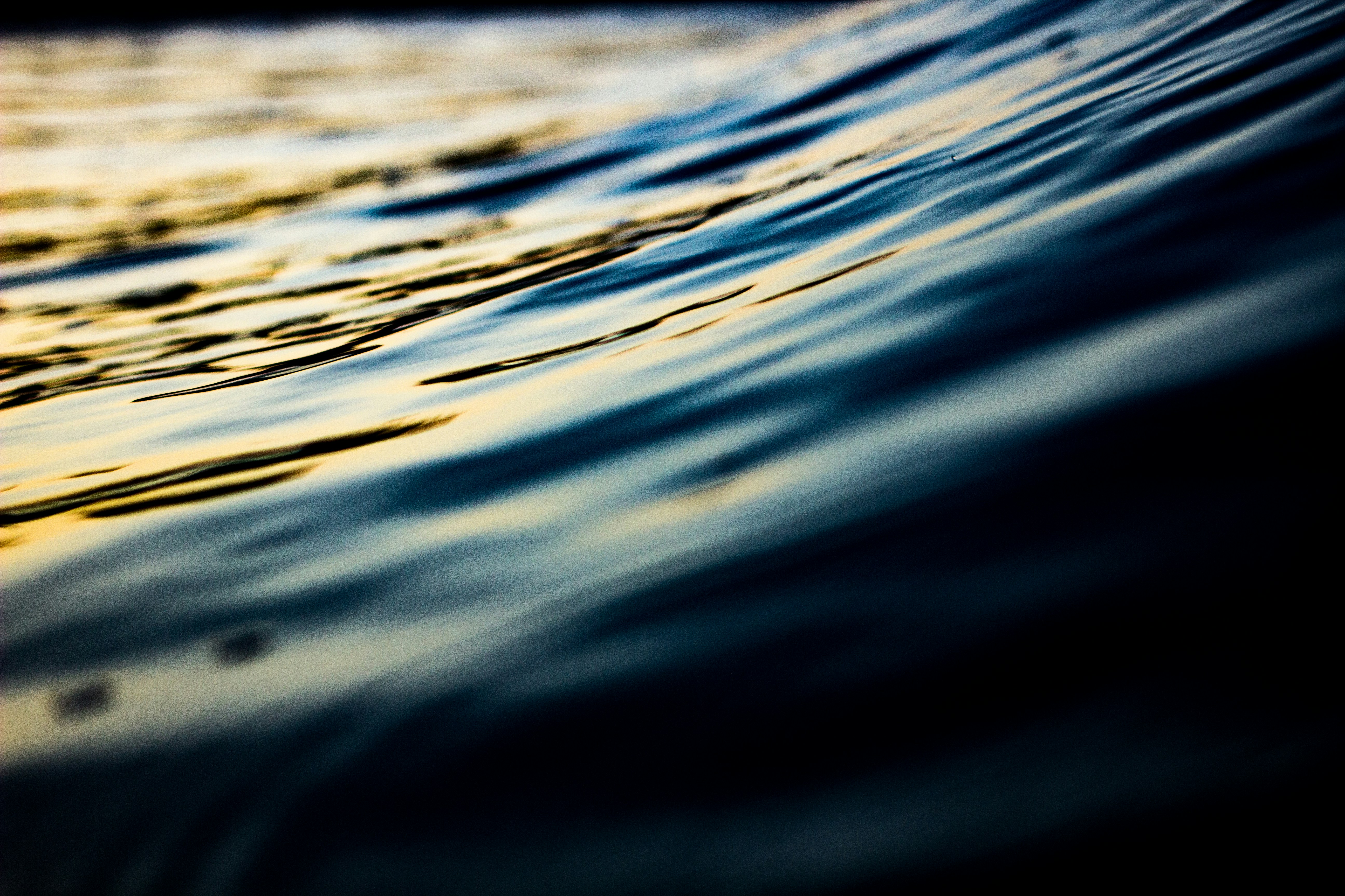 Liquid Horizon: Ripples at Golden Hour