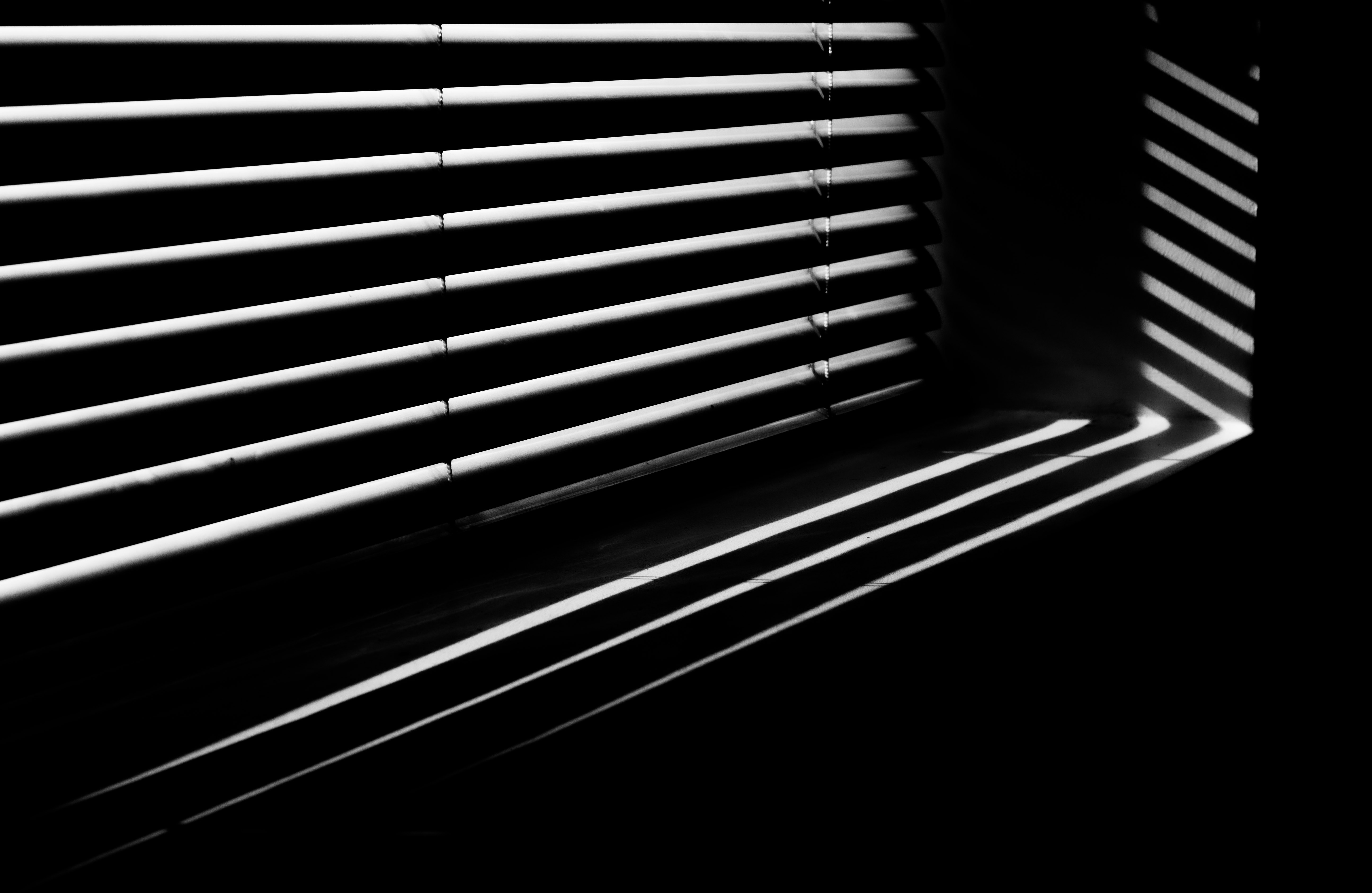 Lines of Light: Minimalist Quiet Through Venetian Blinds