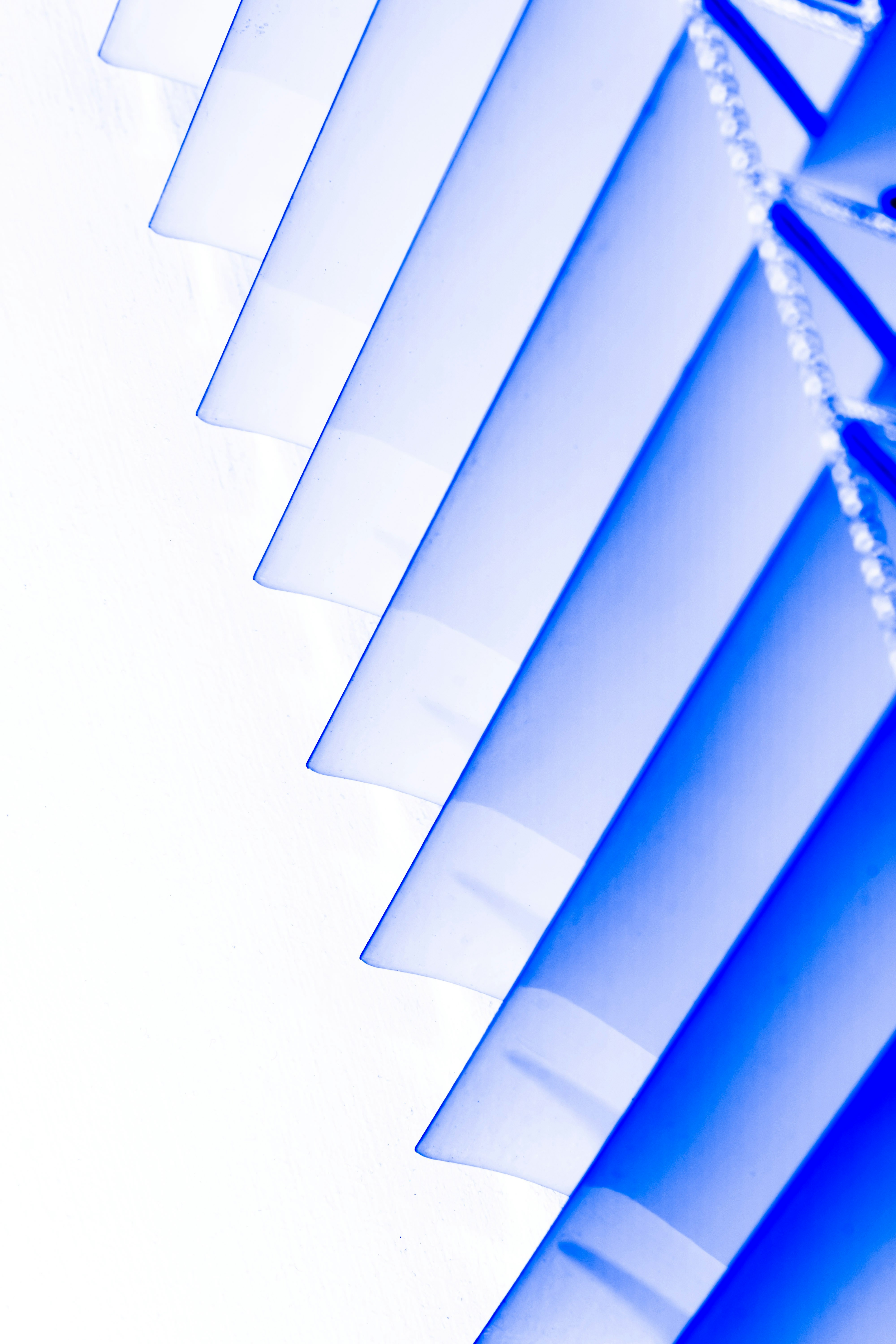 Blue Architectural Arcs: A Diagonal Cadence of Light and Shade