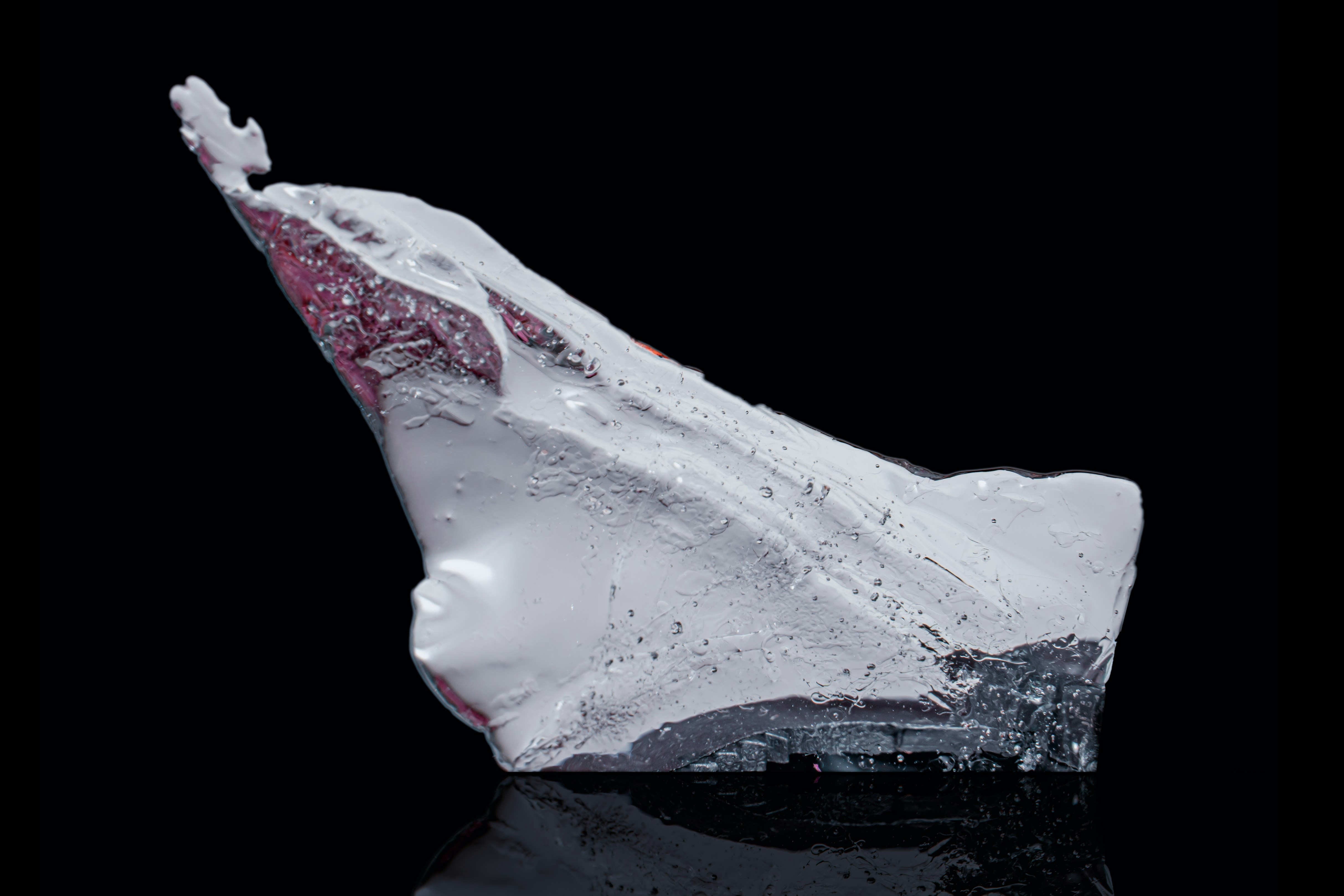 Chiseled Ice Fragment: Precision Edge Against Velvet Black