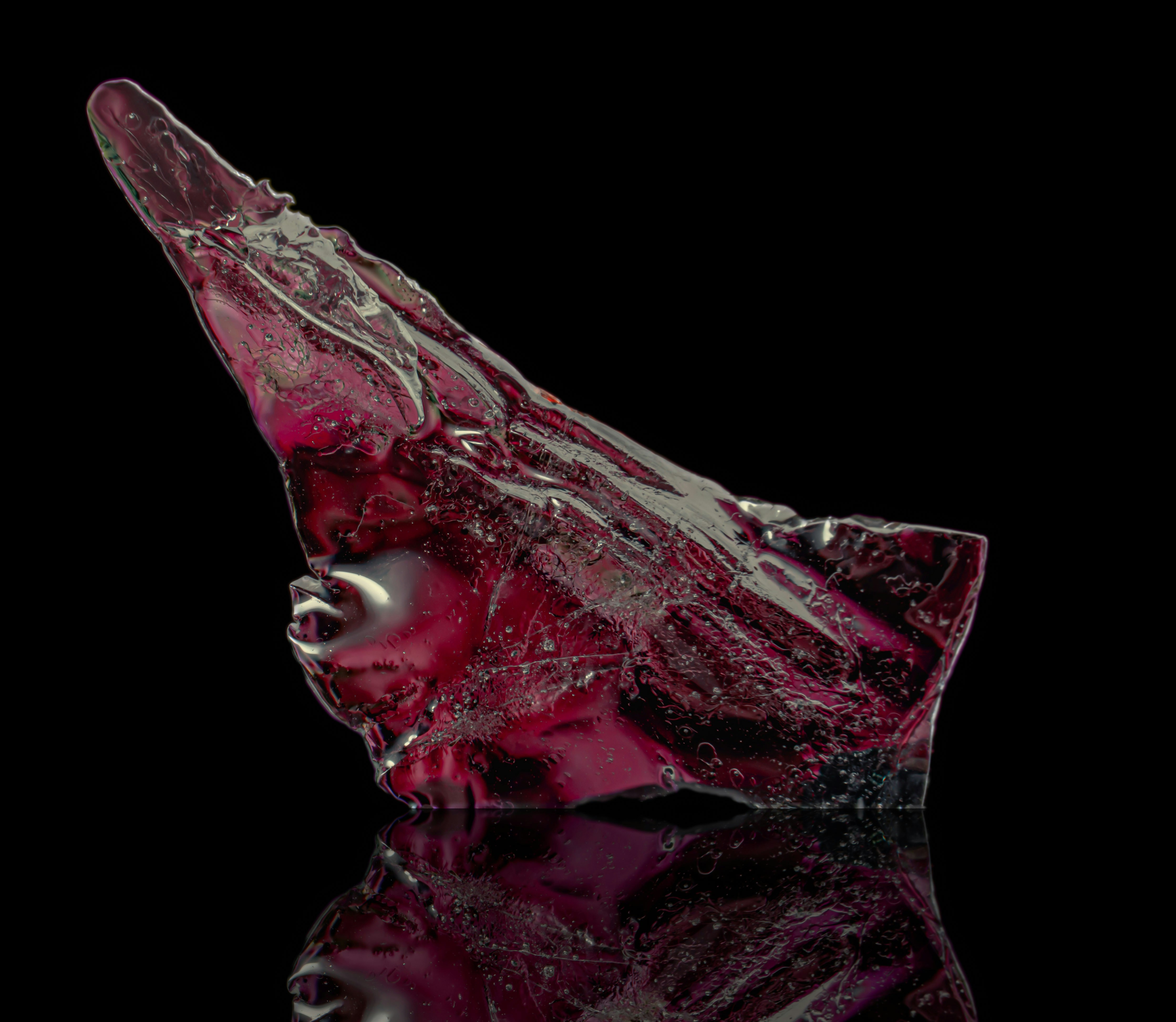 Crystalline Ember: A Magenta Ice Fragment on a Velvet Night