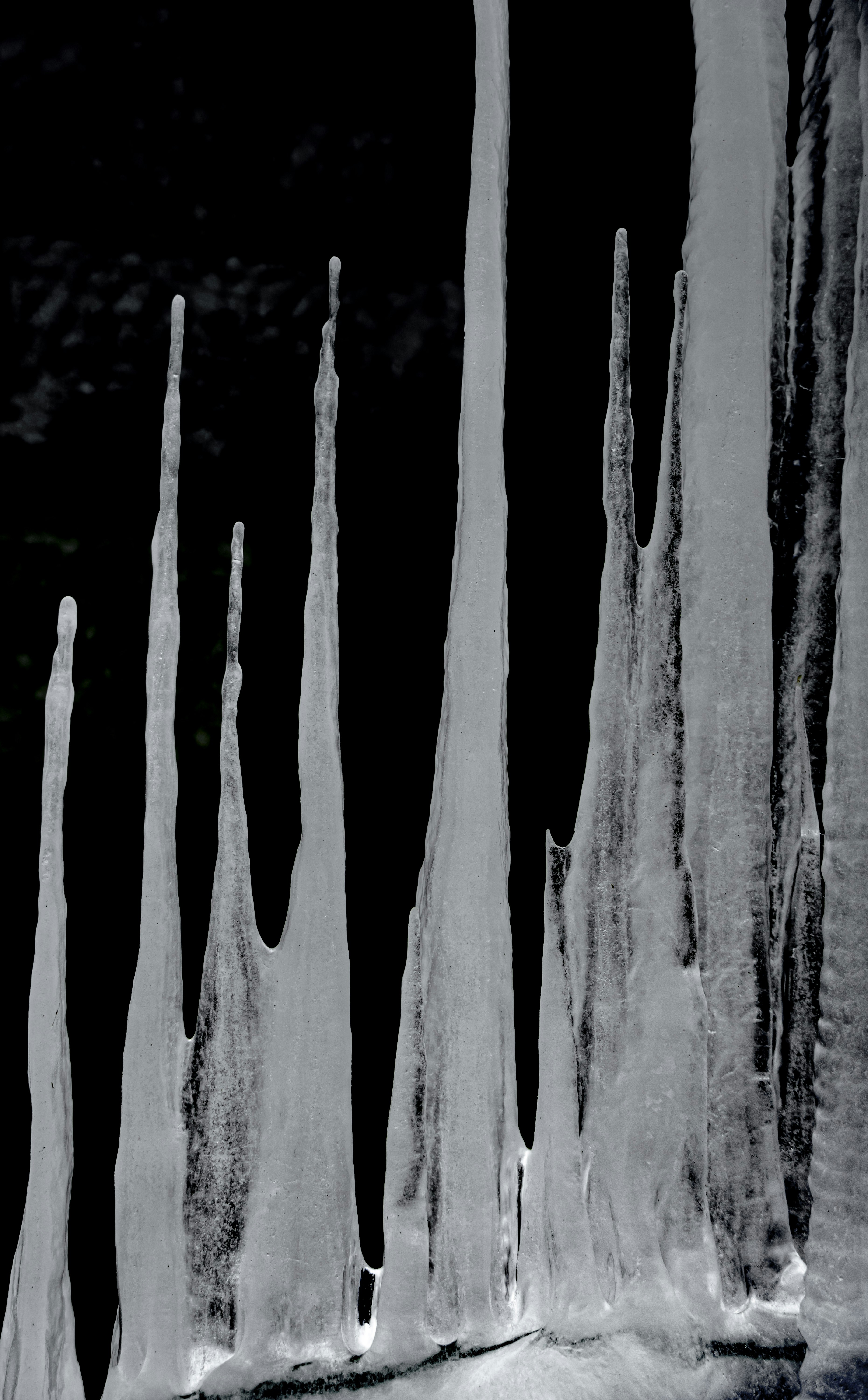 Icy Fingers Reach Skyward on a Darkened Shore
