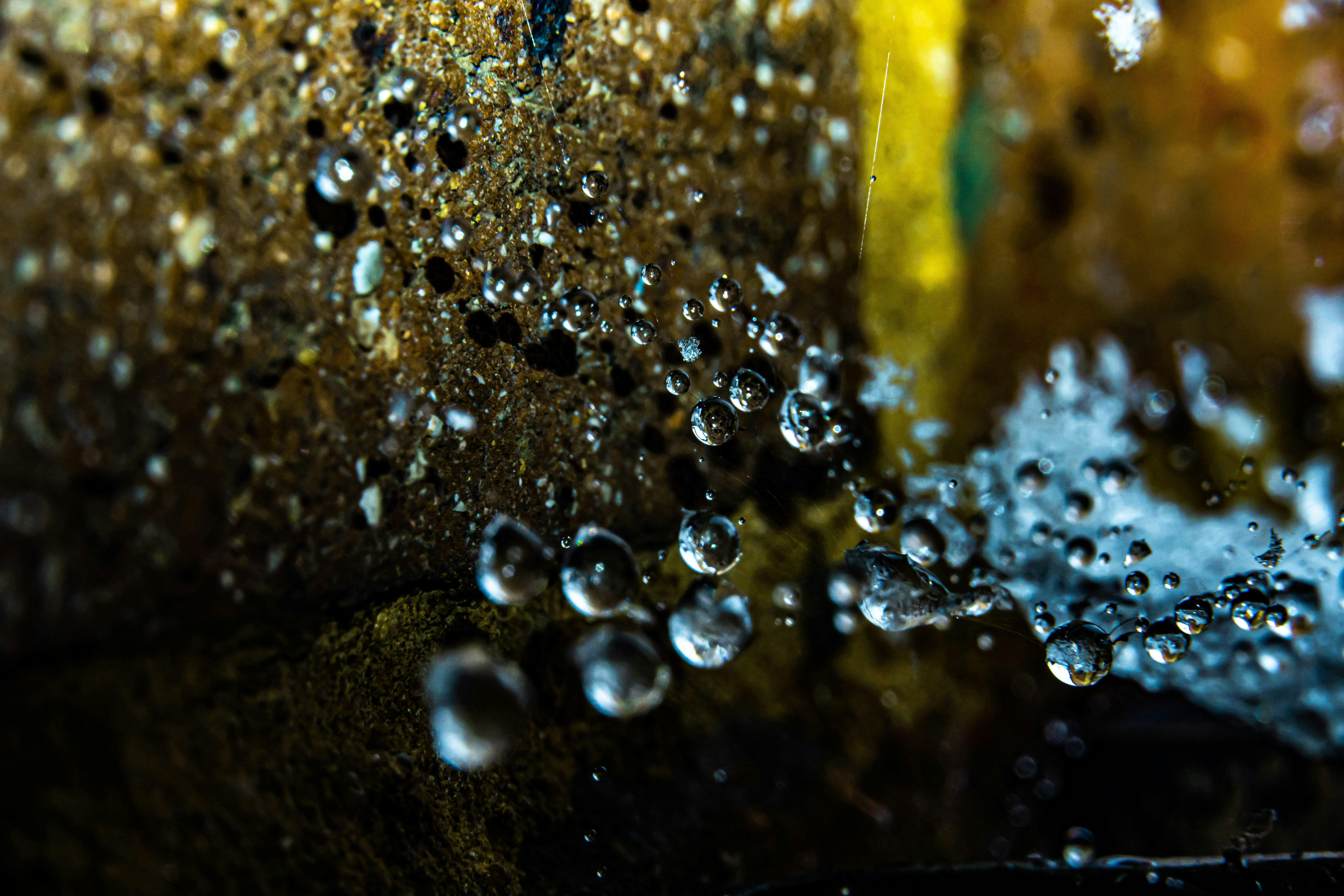 Droplets on a Glacial Surface: Macro Microcosm of Color and Texture