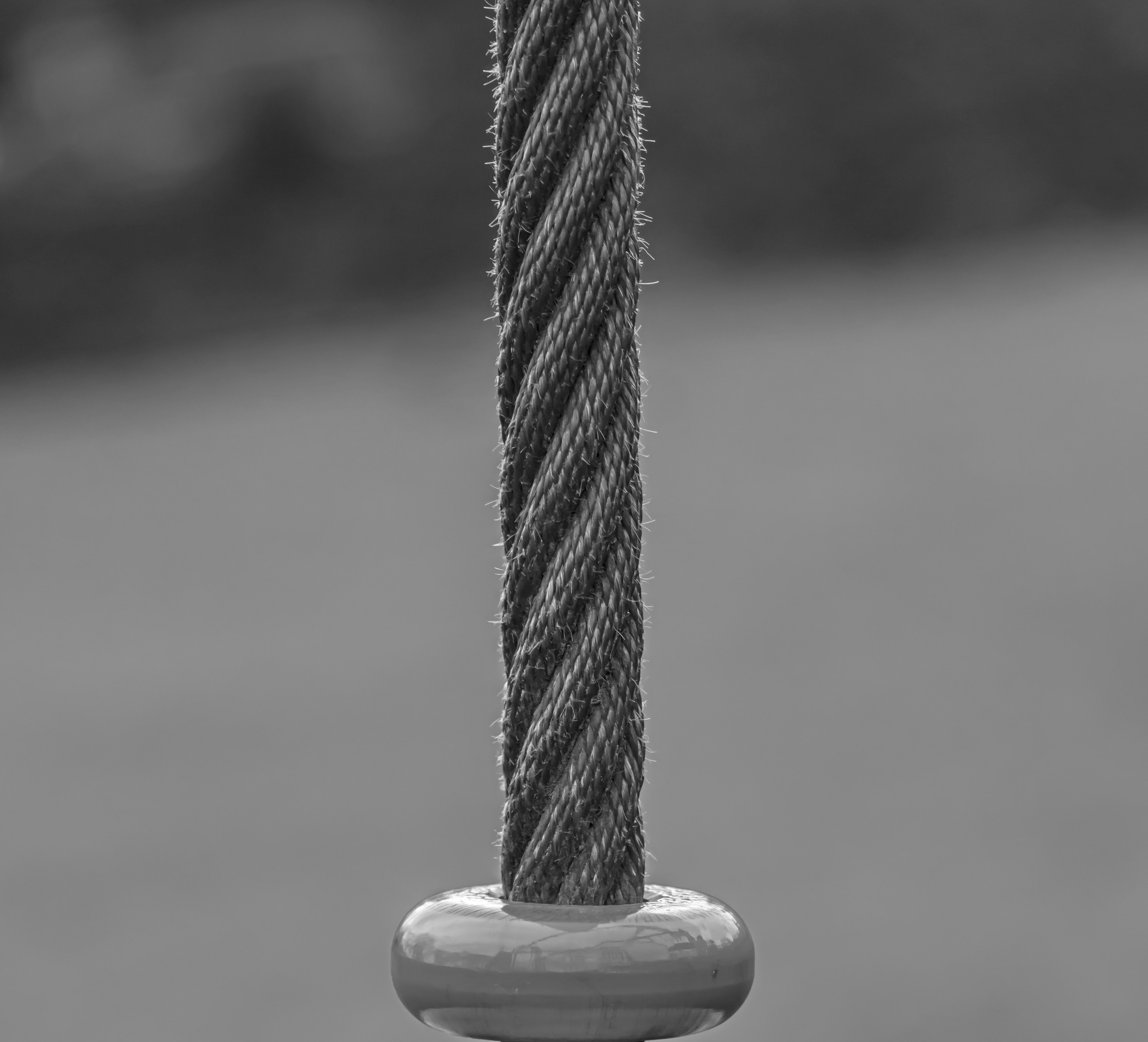 Tethered Texture: Close-up of a Weathered Rope Twist