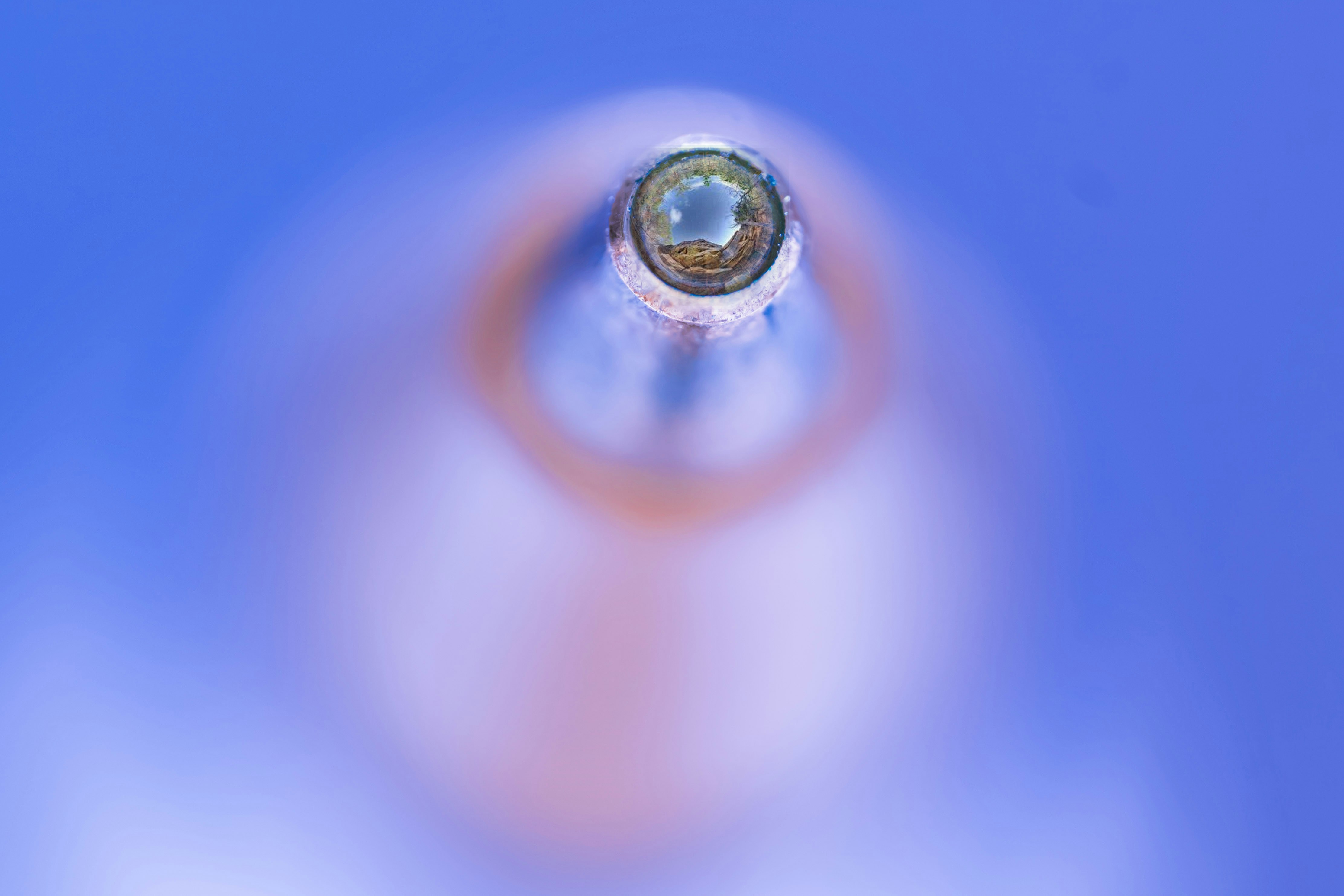 Centerline Aperture: A Close-Up Inside a Blue Cylinder