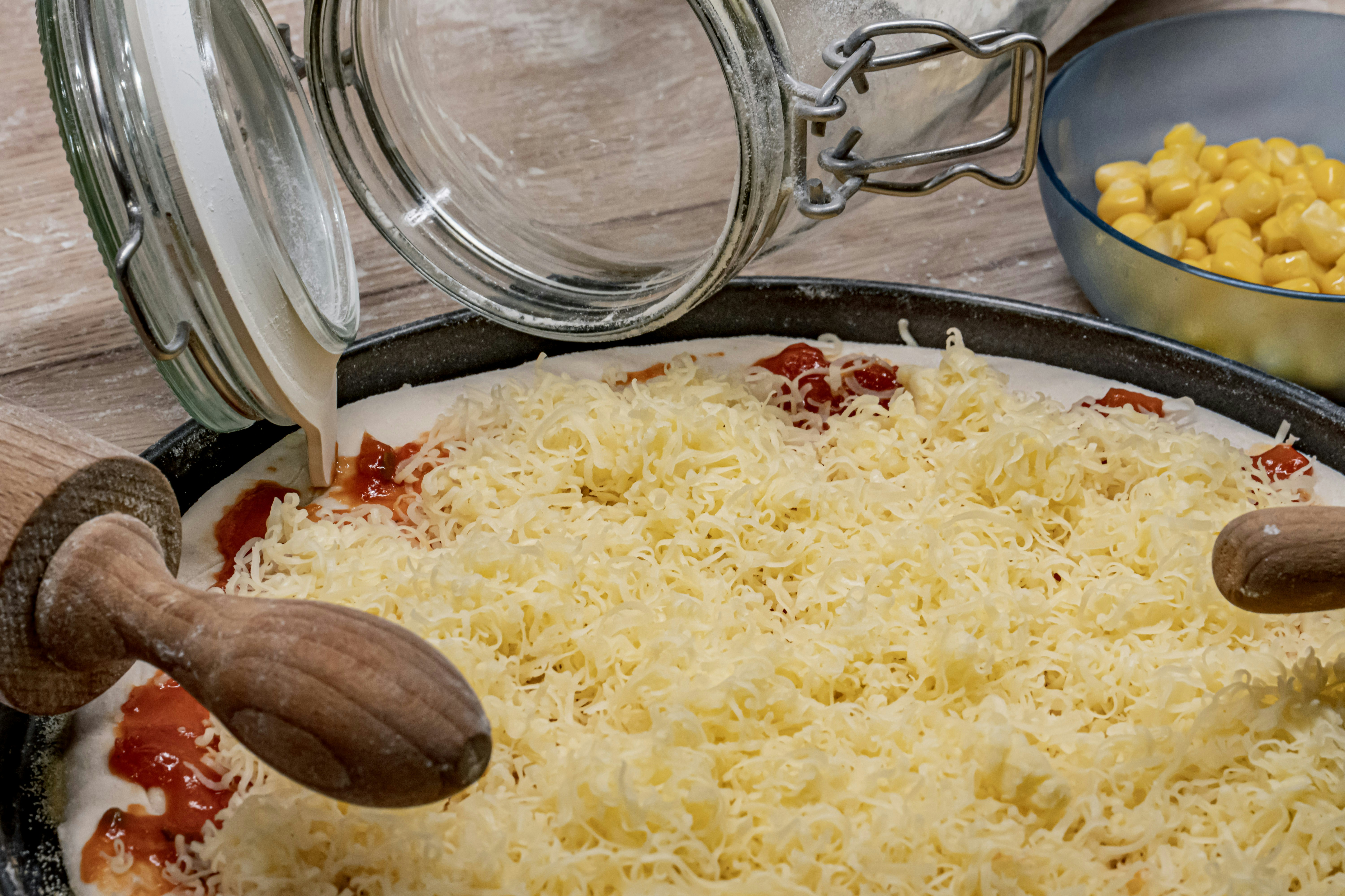 Cheesy skillet harmony: melted cheese over tomato sauce