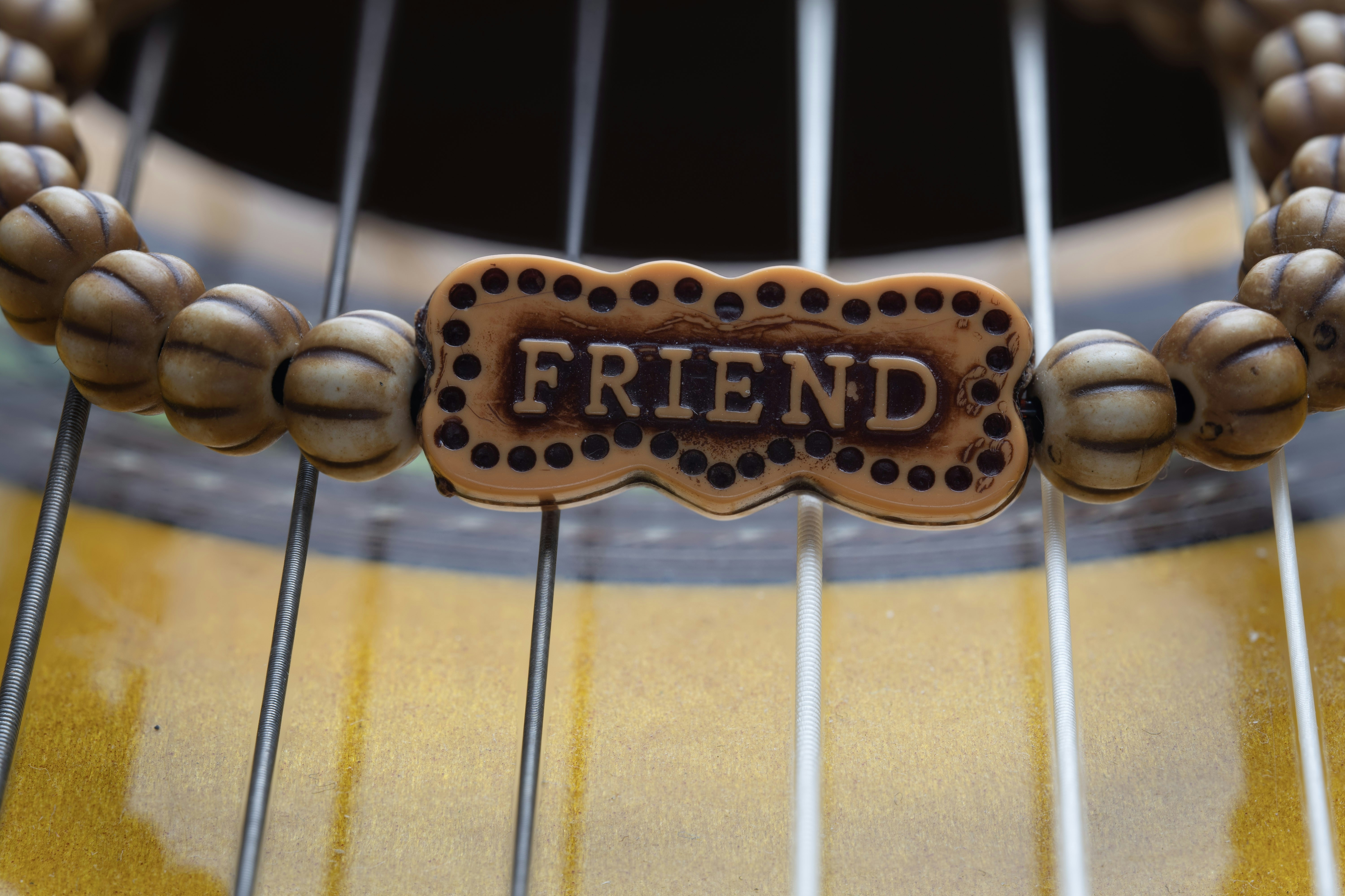Friendship Grilled: A Closer Look at the Beaded Sign