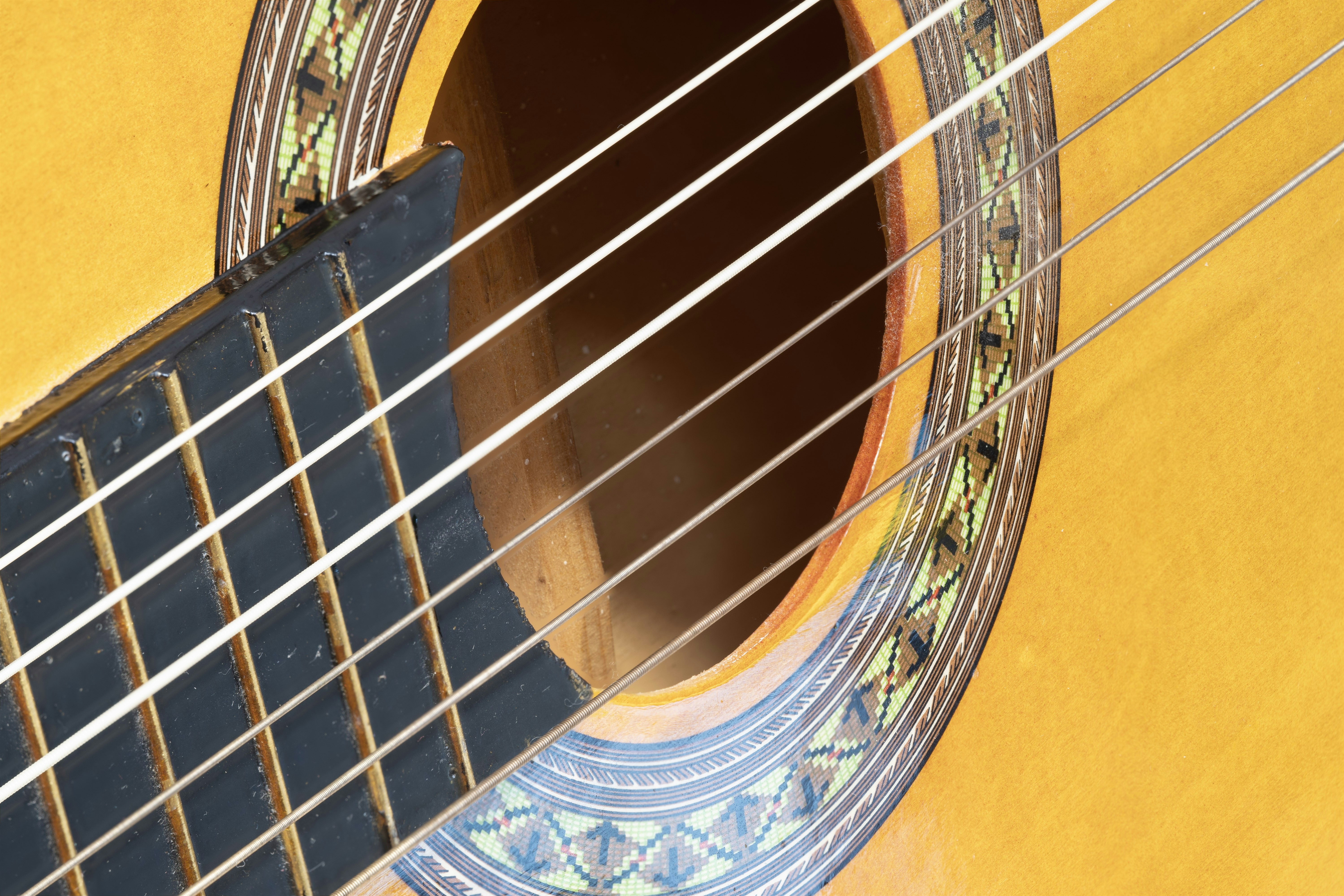 Close-up Resonance: A Guitar’s Soundhole and Strings