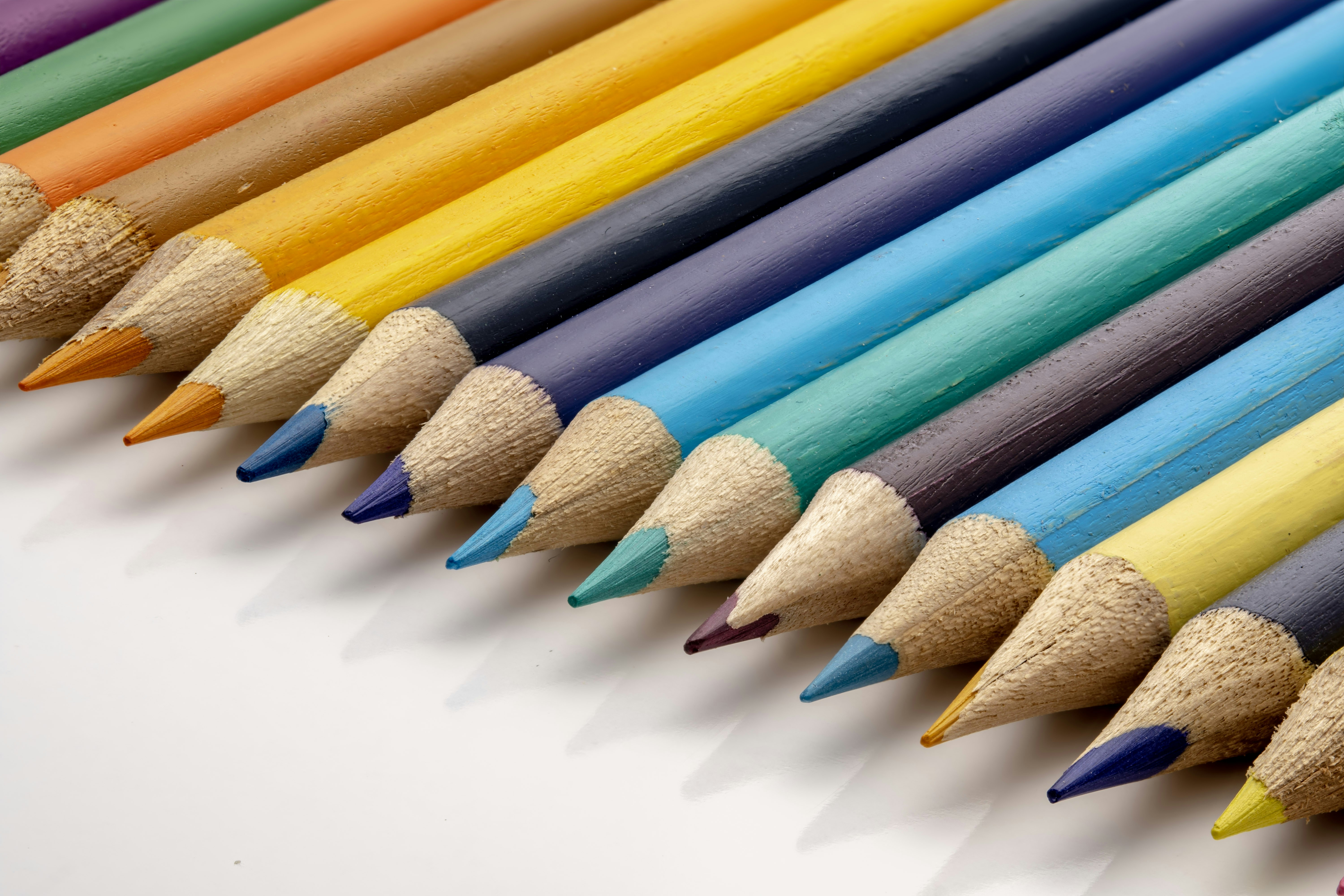 Colored Pencil Chorus: A Row of Sharpened Hues Ready to Inspire