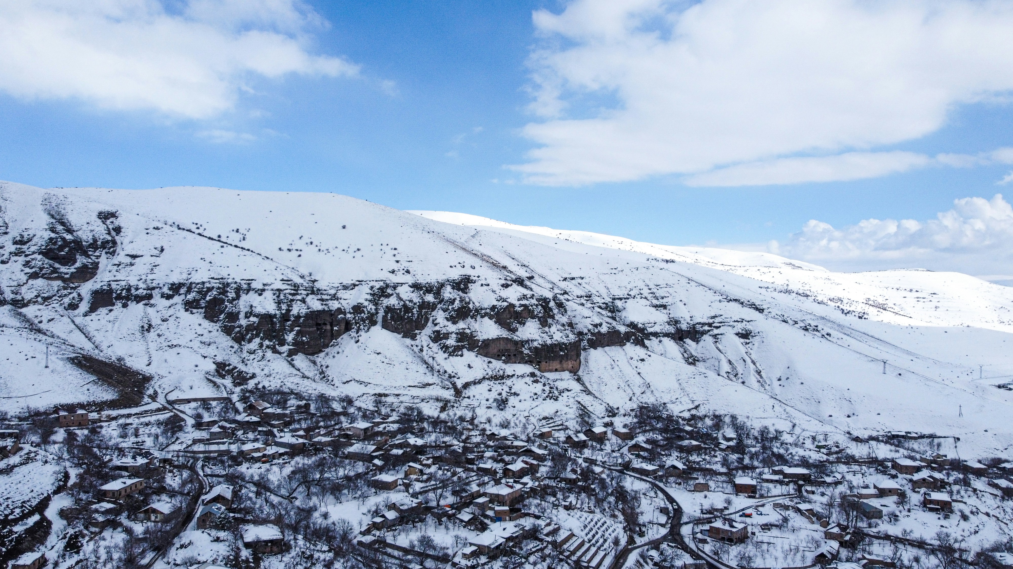 Snowbound Ridge: Ice and Sky Over a Quiet Canyon