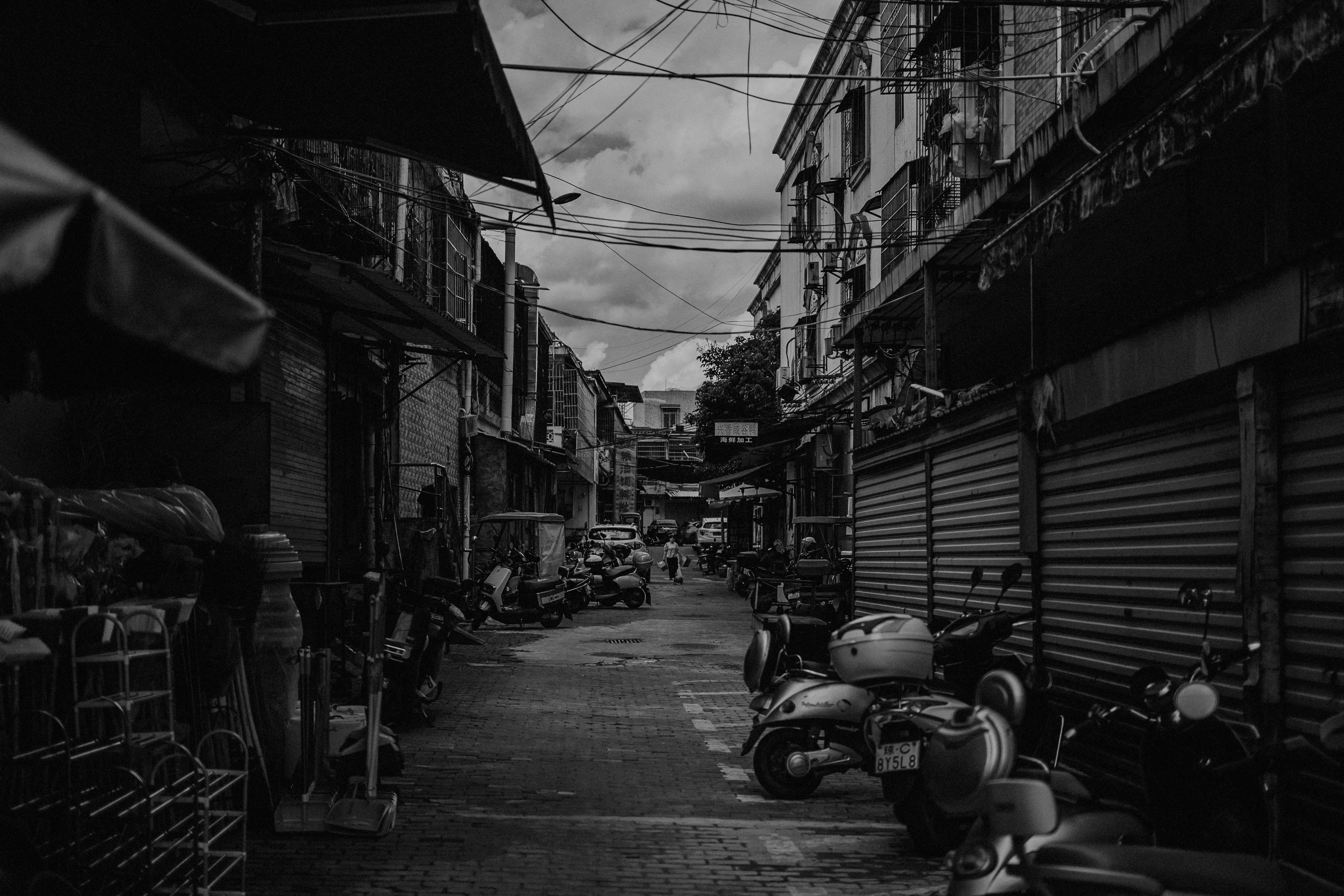 Night Market Corridor: Quiet Street Between Shuttered Shops