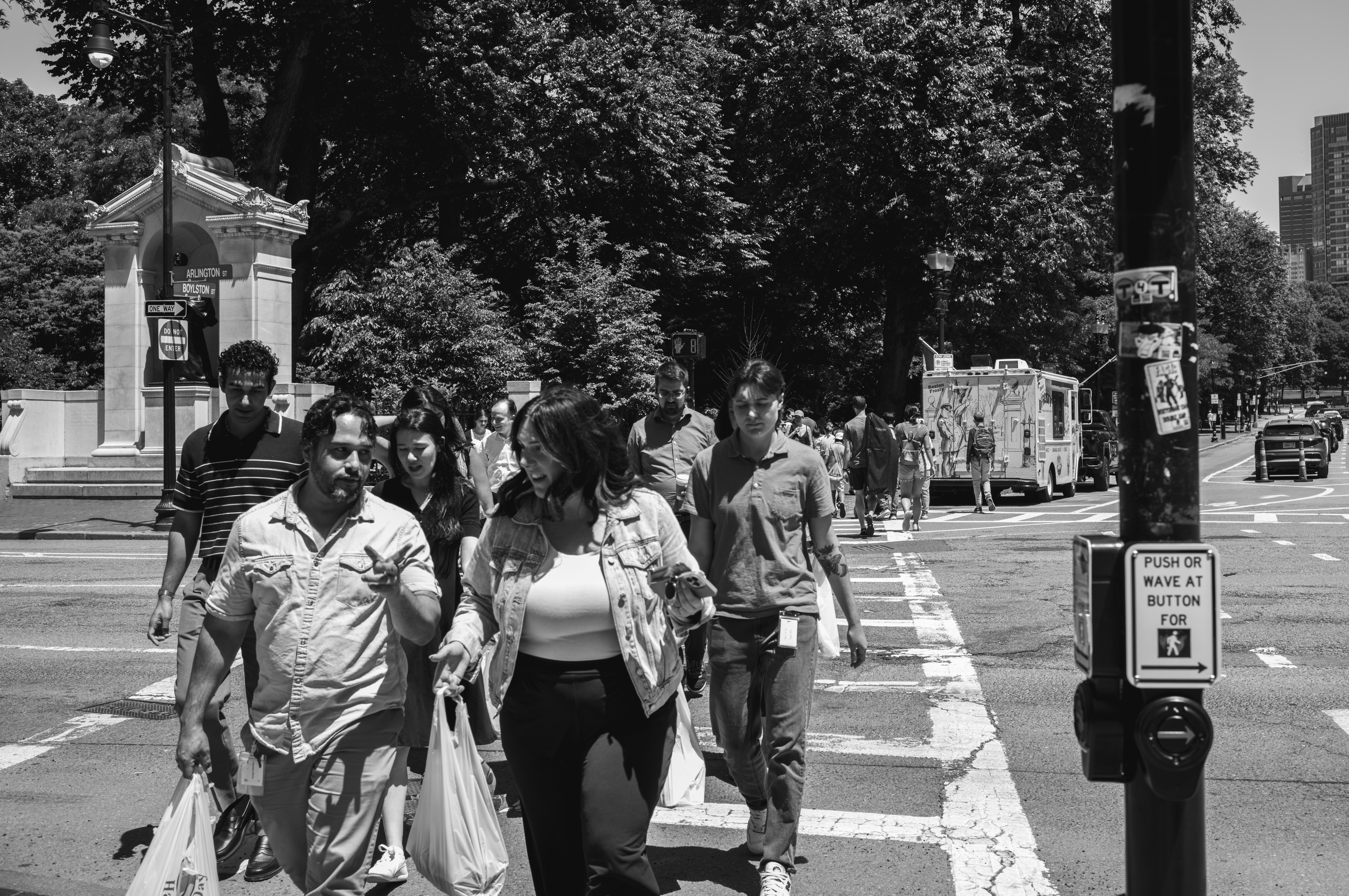 Crosswalk Chorus: A Black-and-White Moment on City Streets