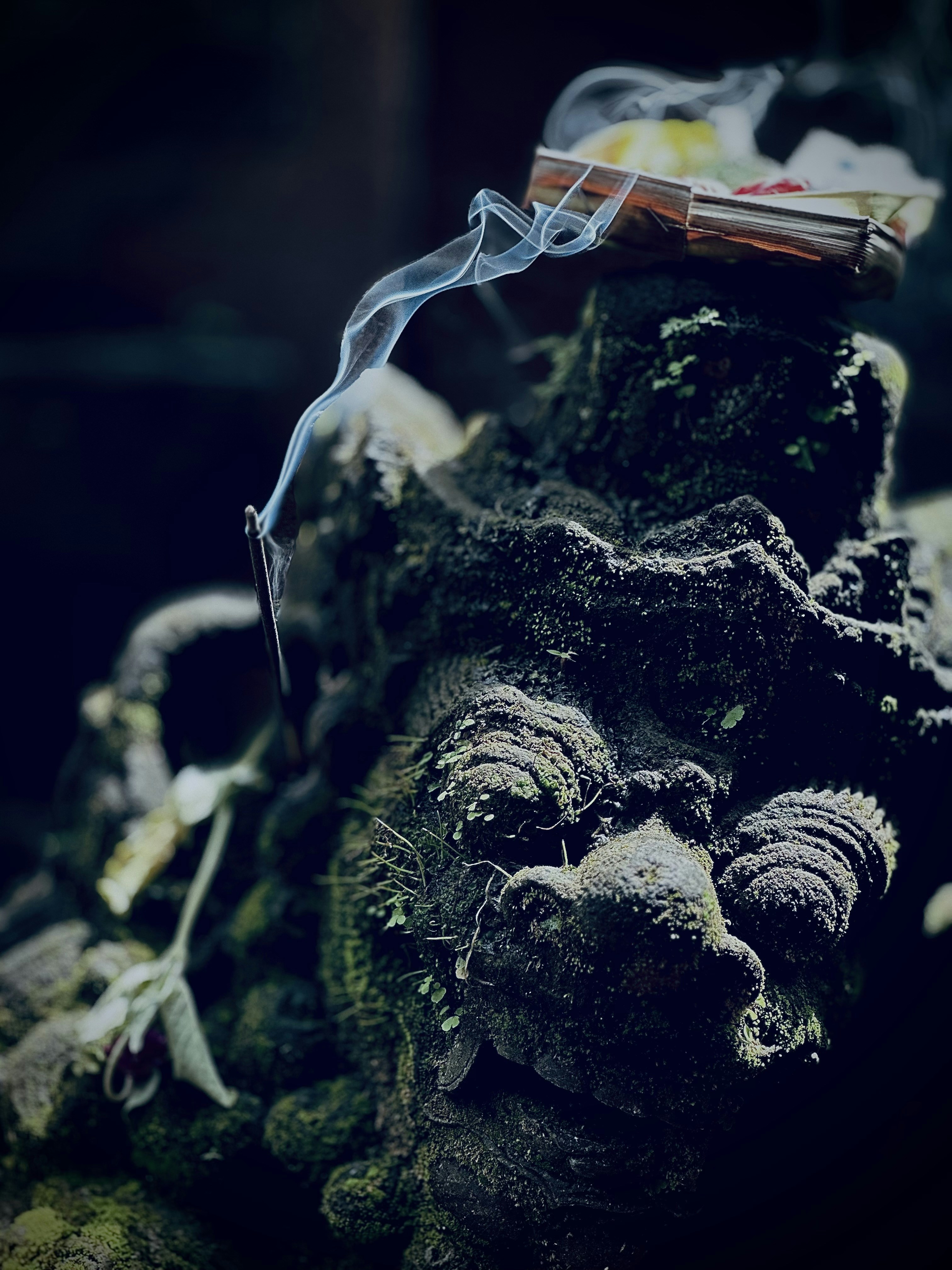 Smoldering Idol: incense, moss and stone in quiet ruin