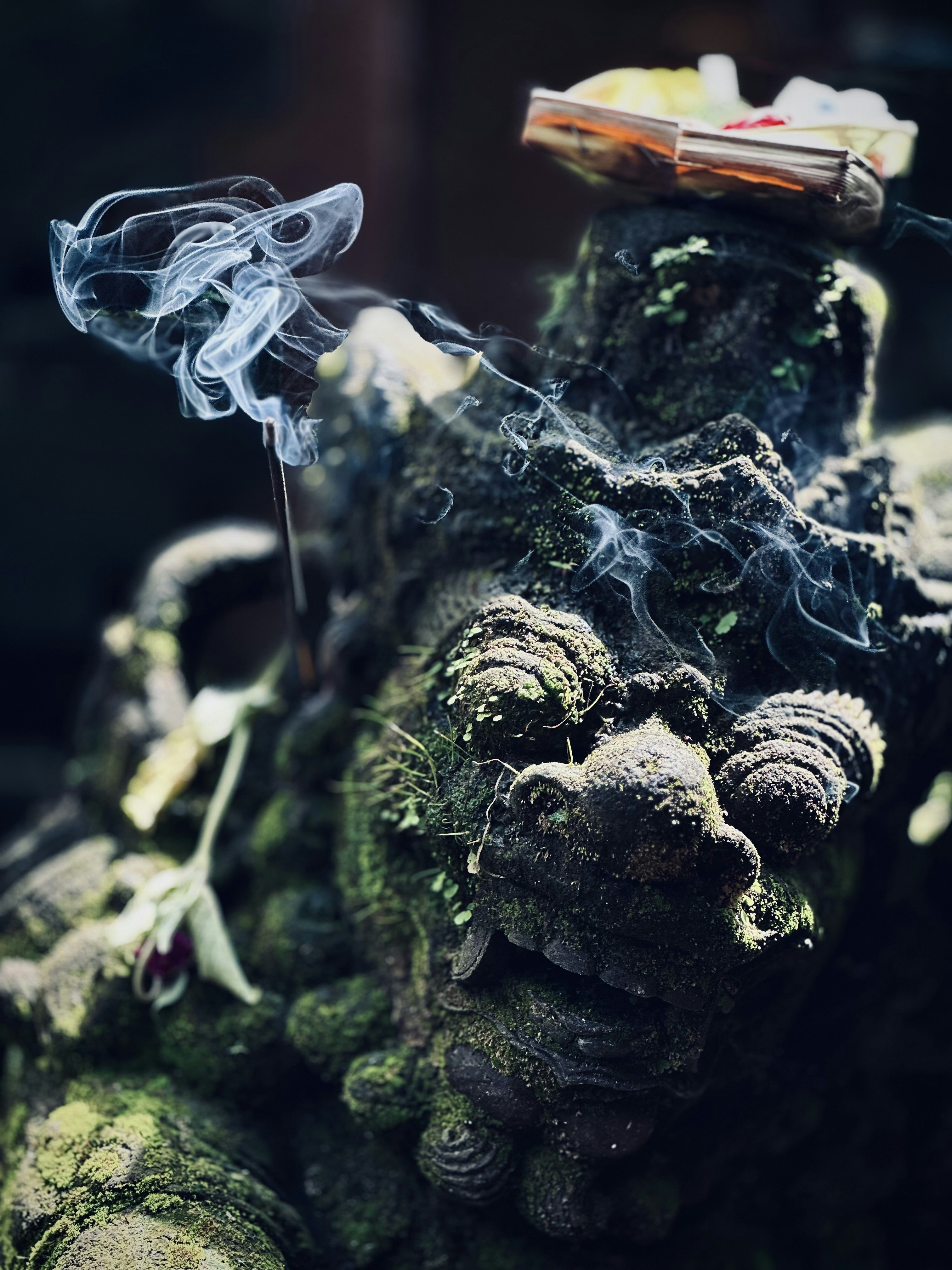 Mossy guardian and fragrant wisp in a candlelit shrine