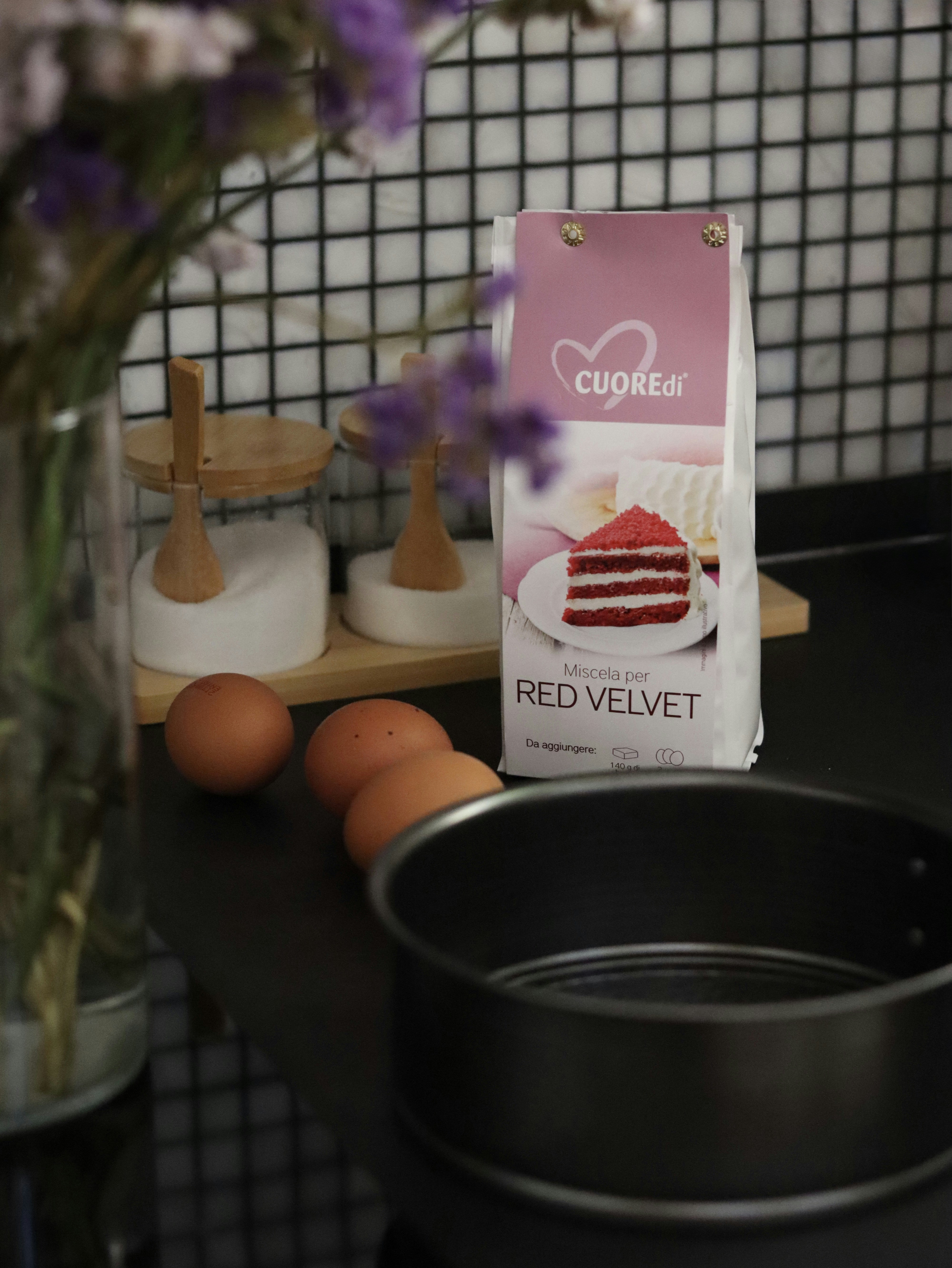 Slice of Velvet: A Baking Desk Scene with Red Velvet Packaging