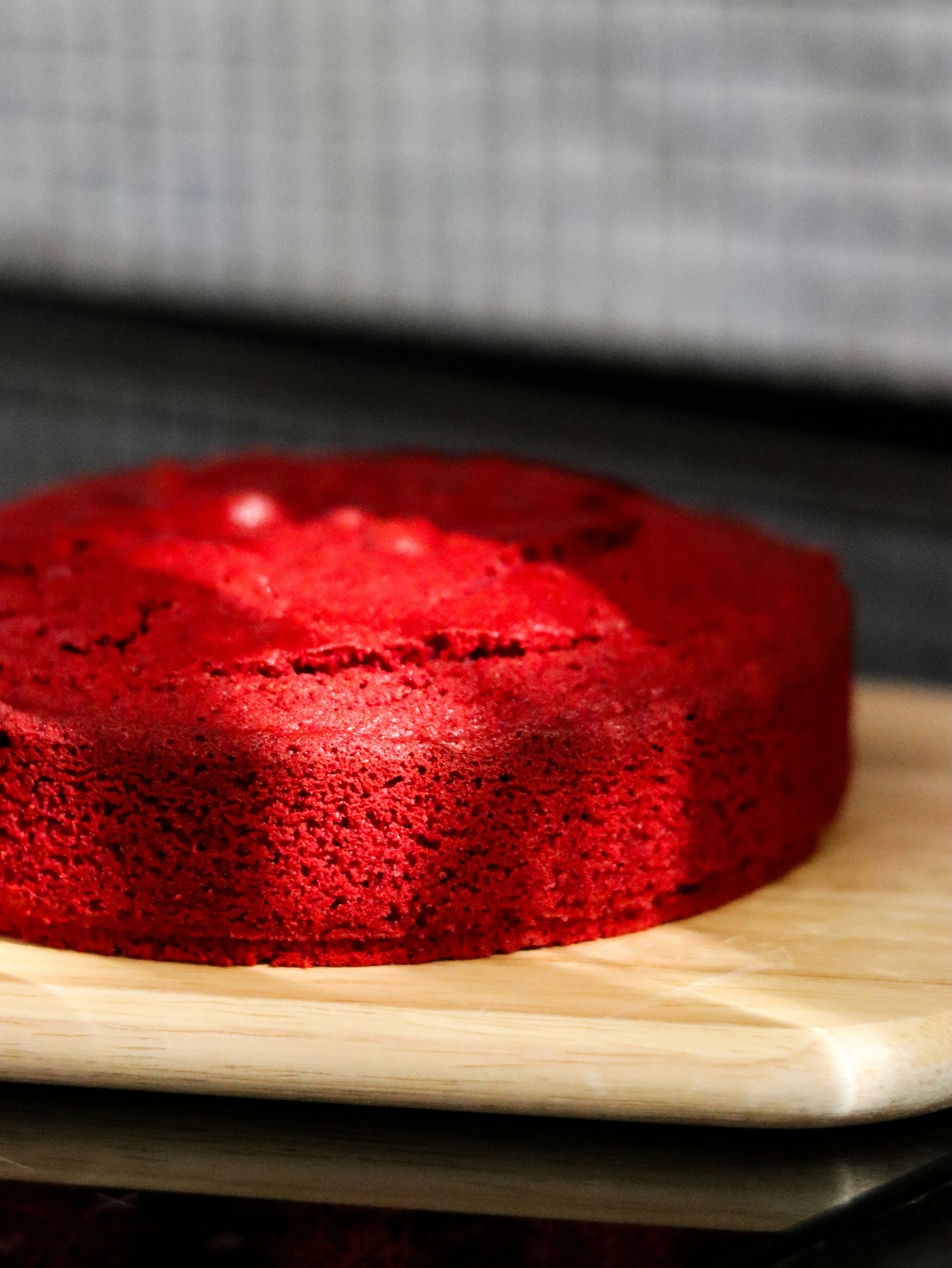 Red Velvet Ring: A Close-Up of Chocolate-Cake Texture on a Wooden Board