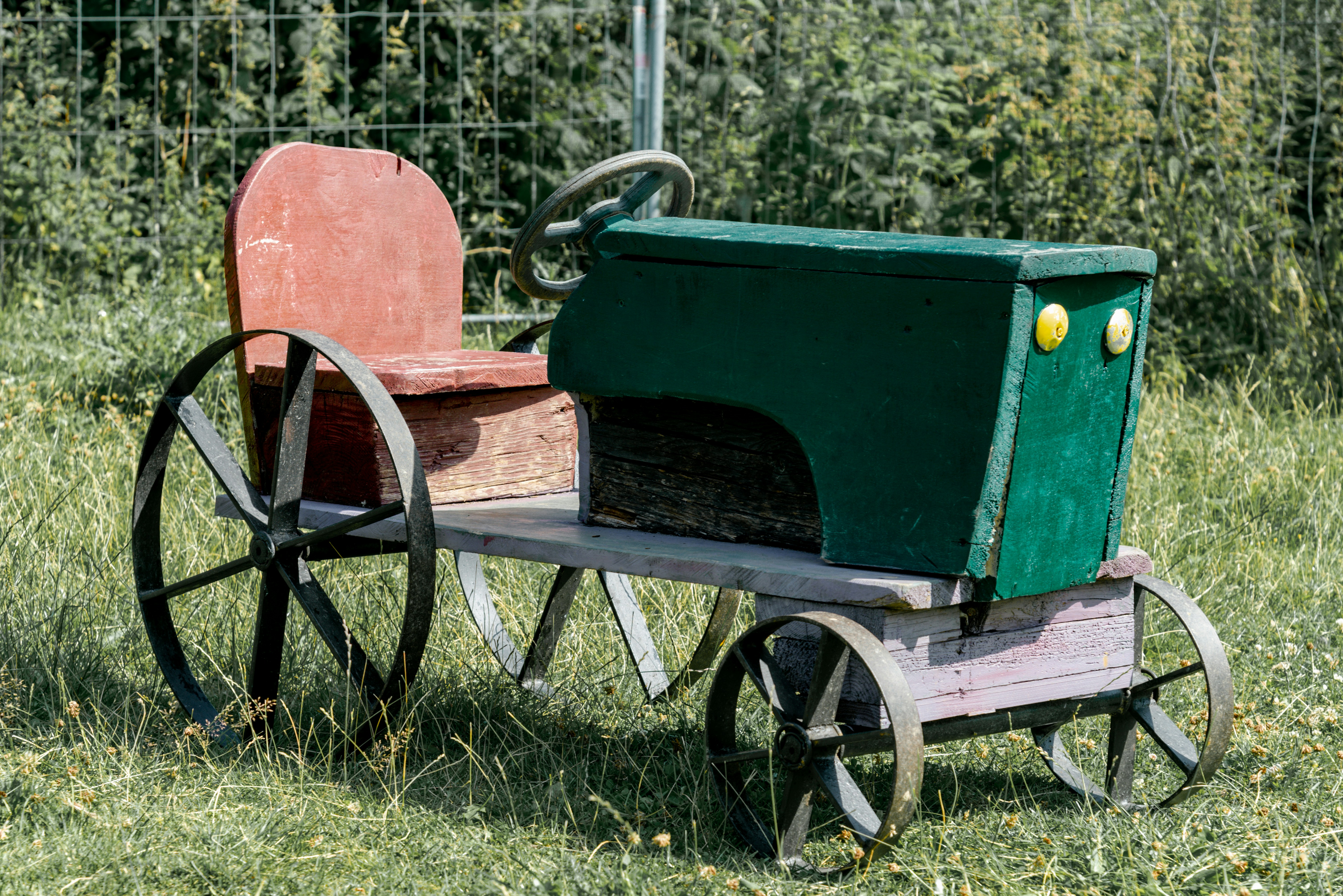 Wheeled Windmill Wagon in Sunlit Field