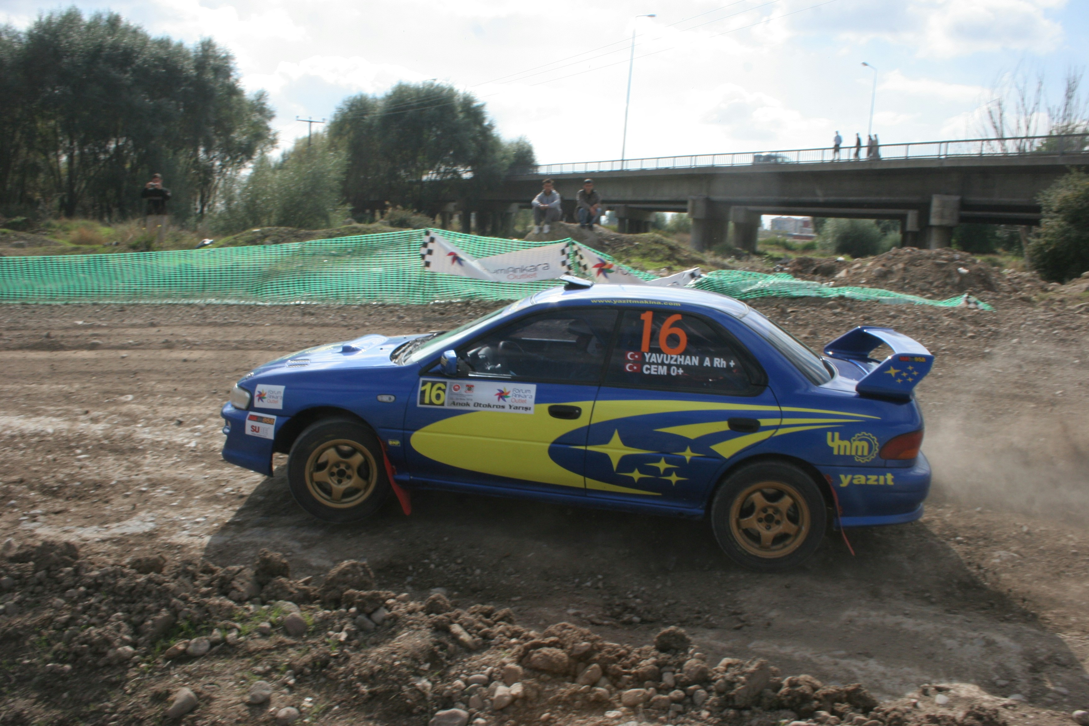 Rally Car in Dusty Off-Road Chase