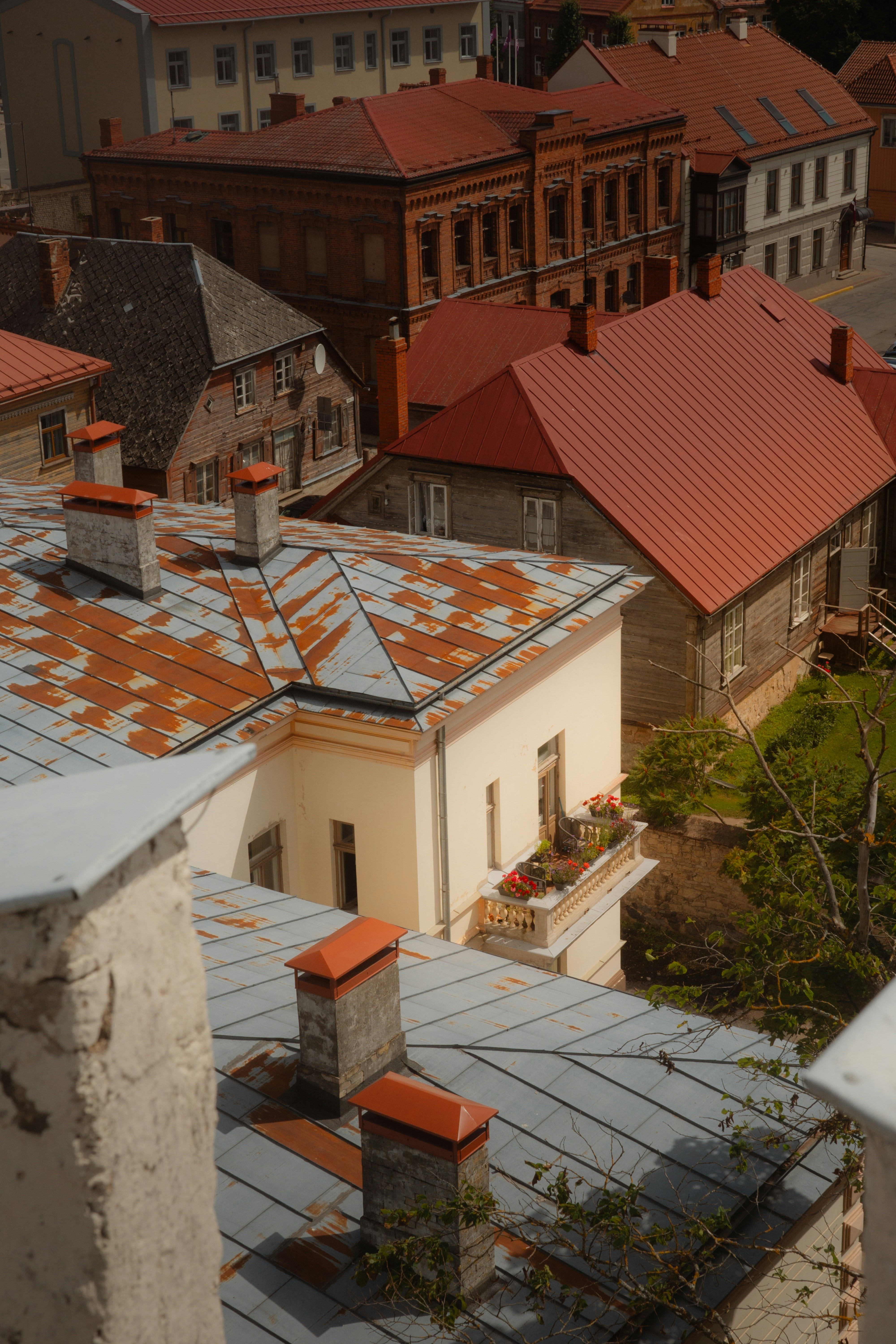 Terracotta Rooftops cascading through a sunlit historic street