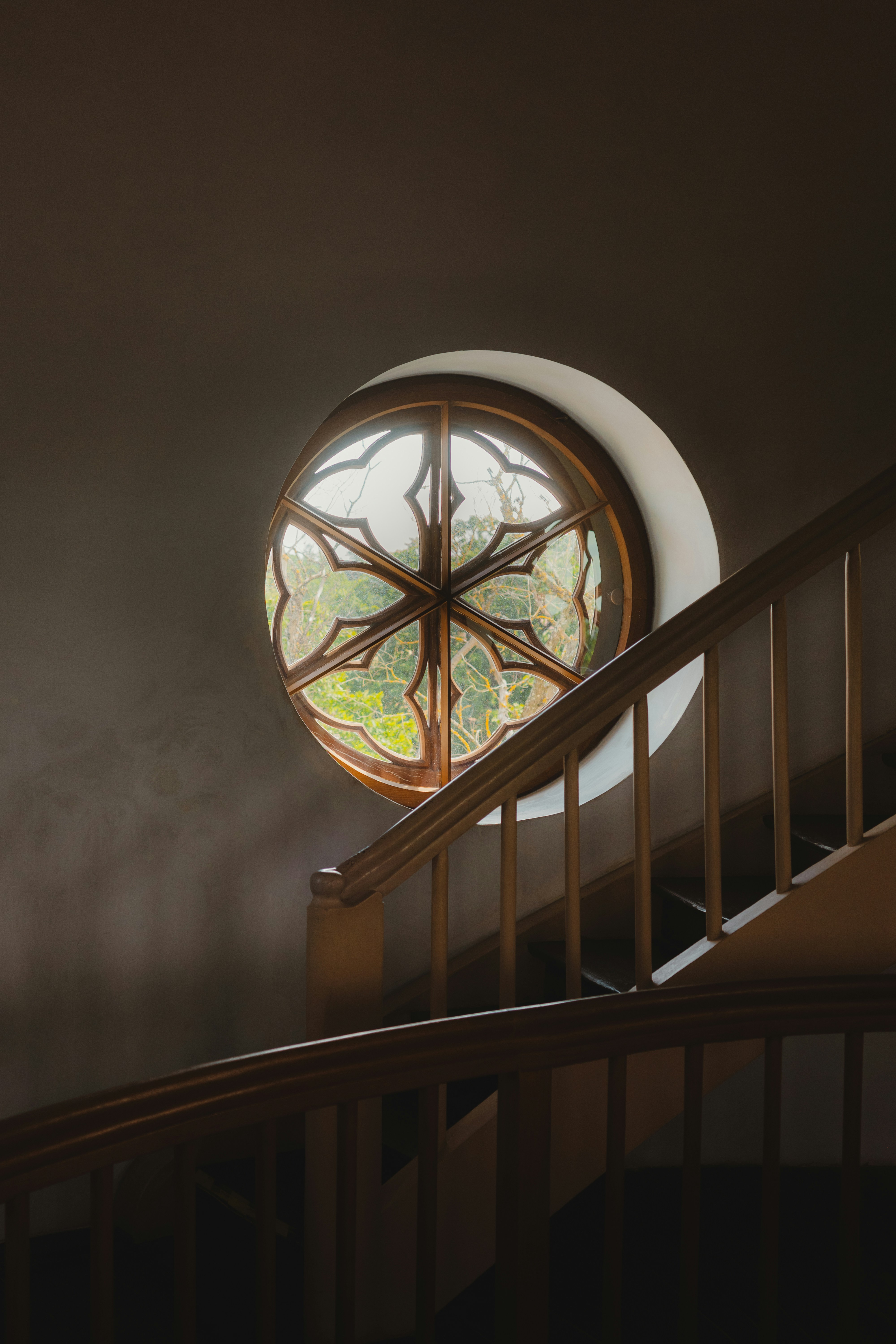 Circular Window of Light Framing a Staircase
