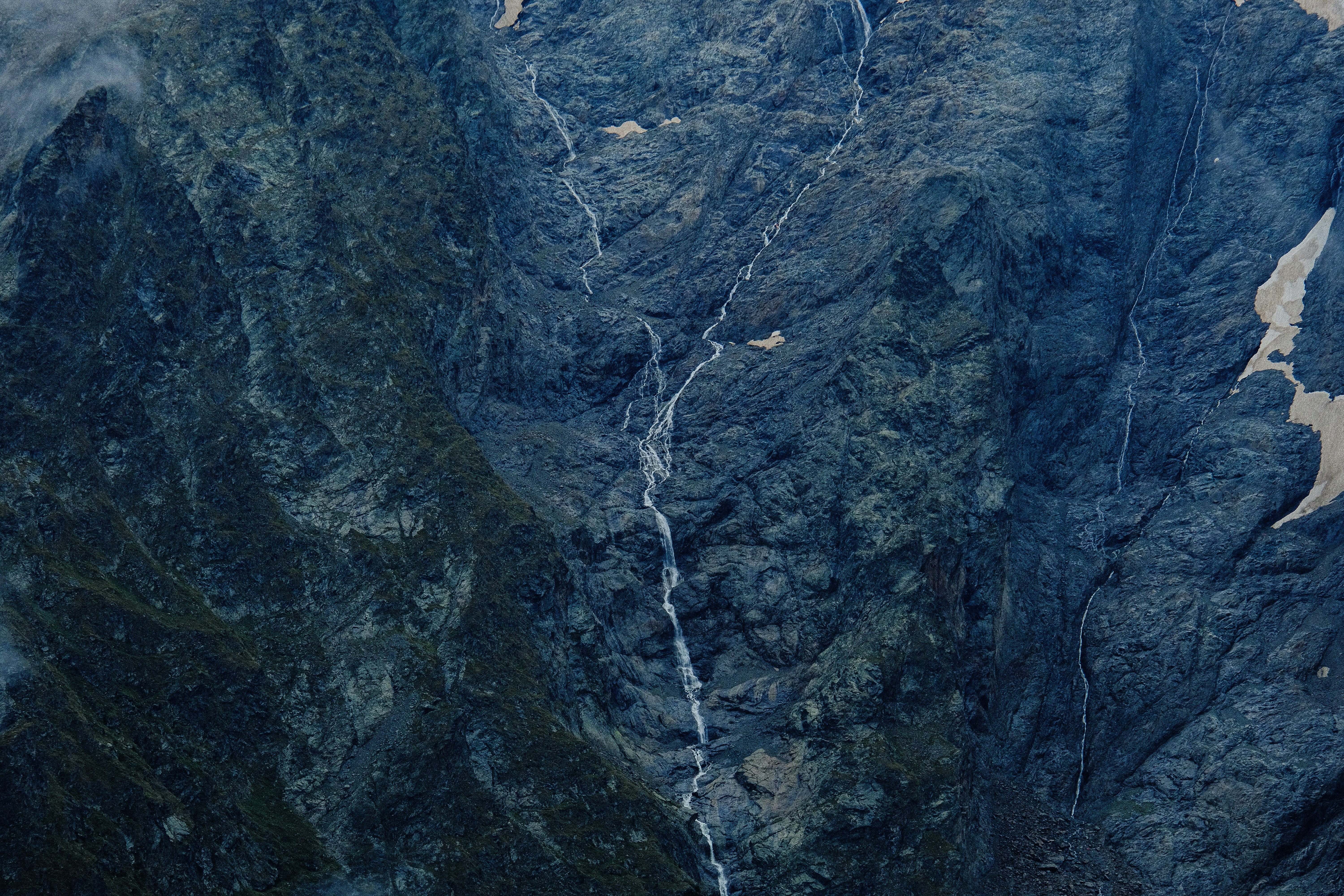 Crackling Veins: A Mountain Pass Carved in Stone