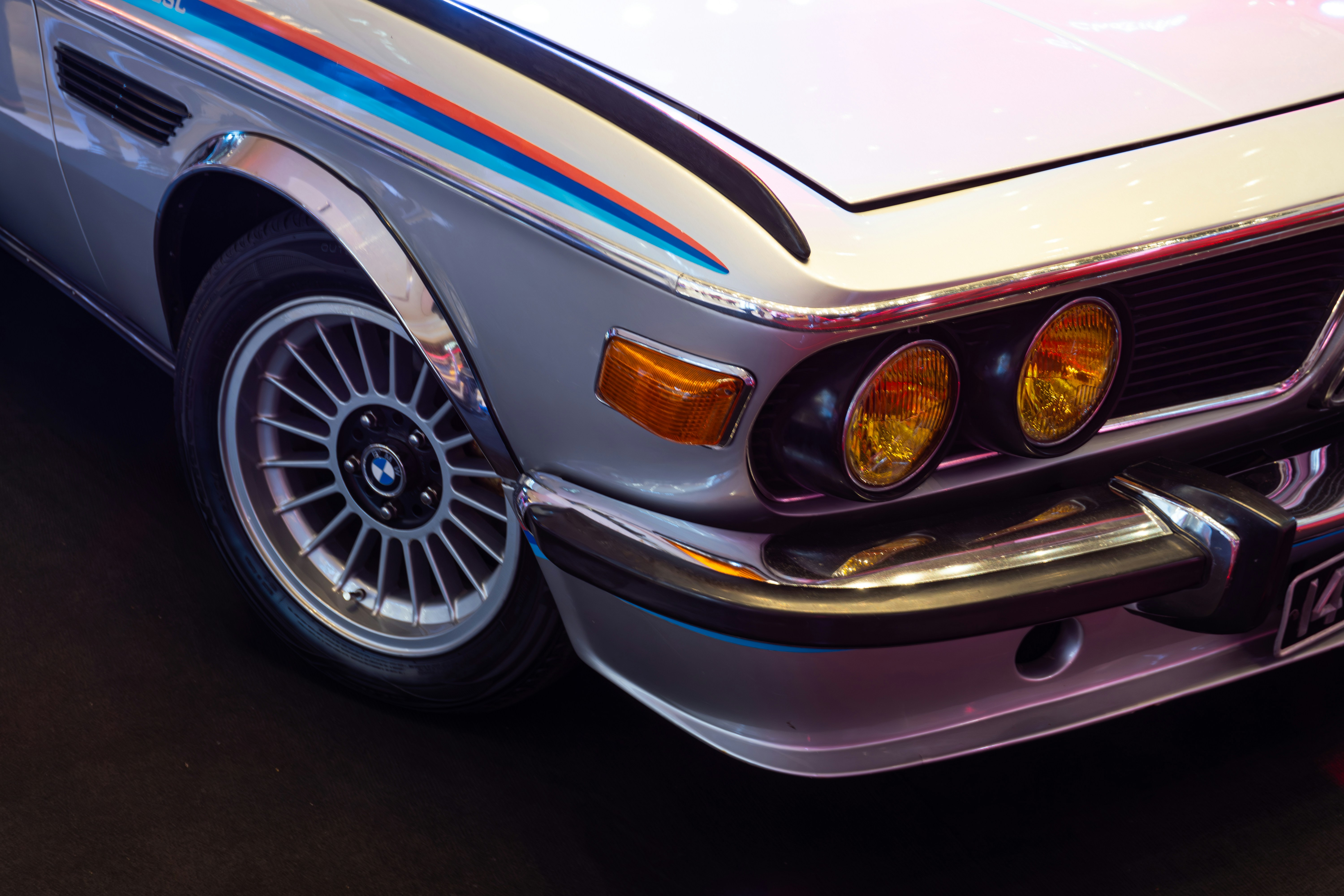 Front-Quarter Glint: Classic BMW Dramatizes Light and Lineage