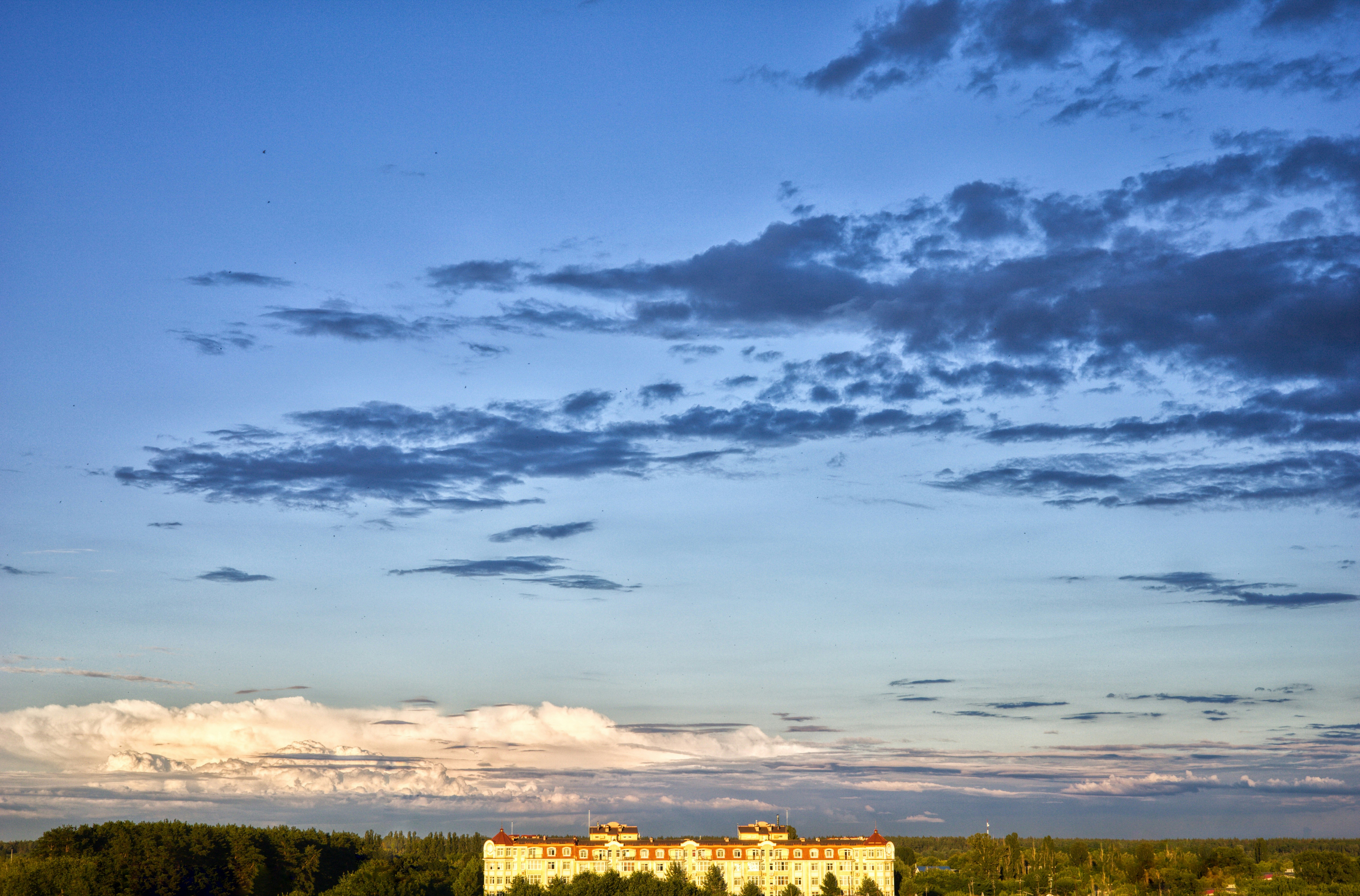 Empire at Dusk: A Riverside Chateau Under a Quiet Sky
