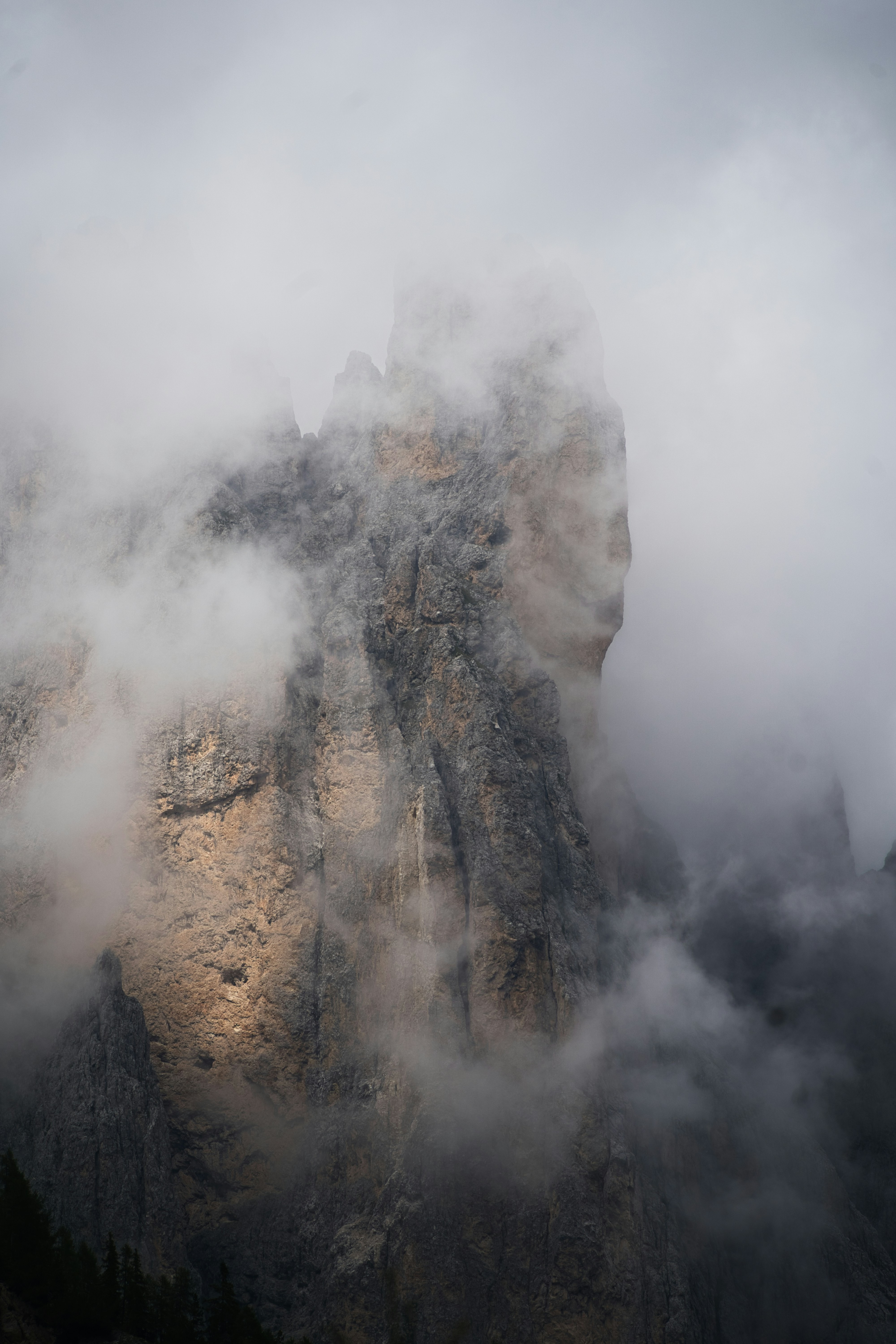 Mist-Clad Spire Rising from the Cloud Veil