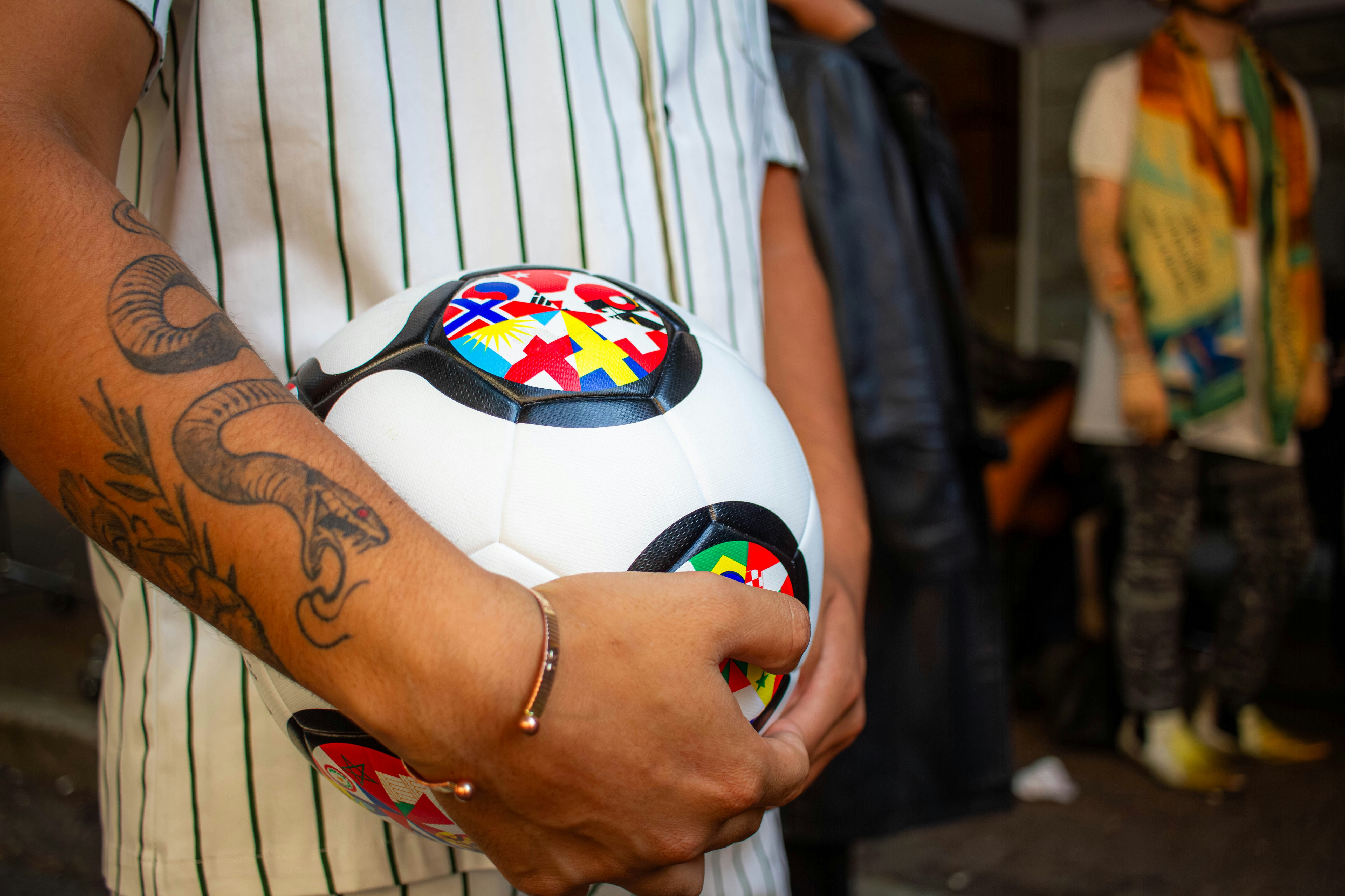 Holding the World in a Playful Grip: A Soccer Ball with Global Flags