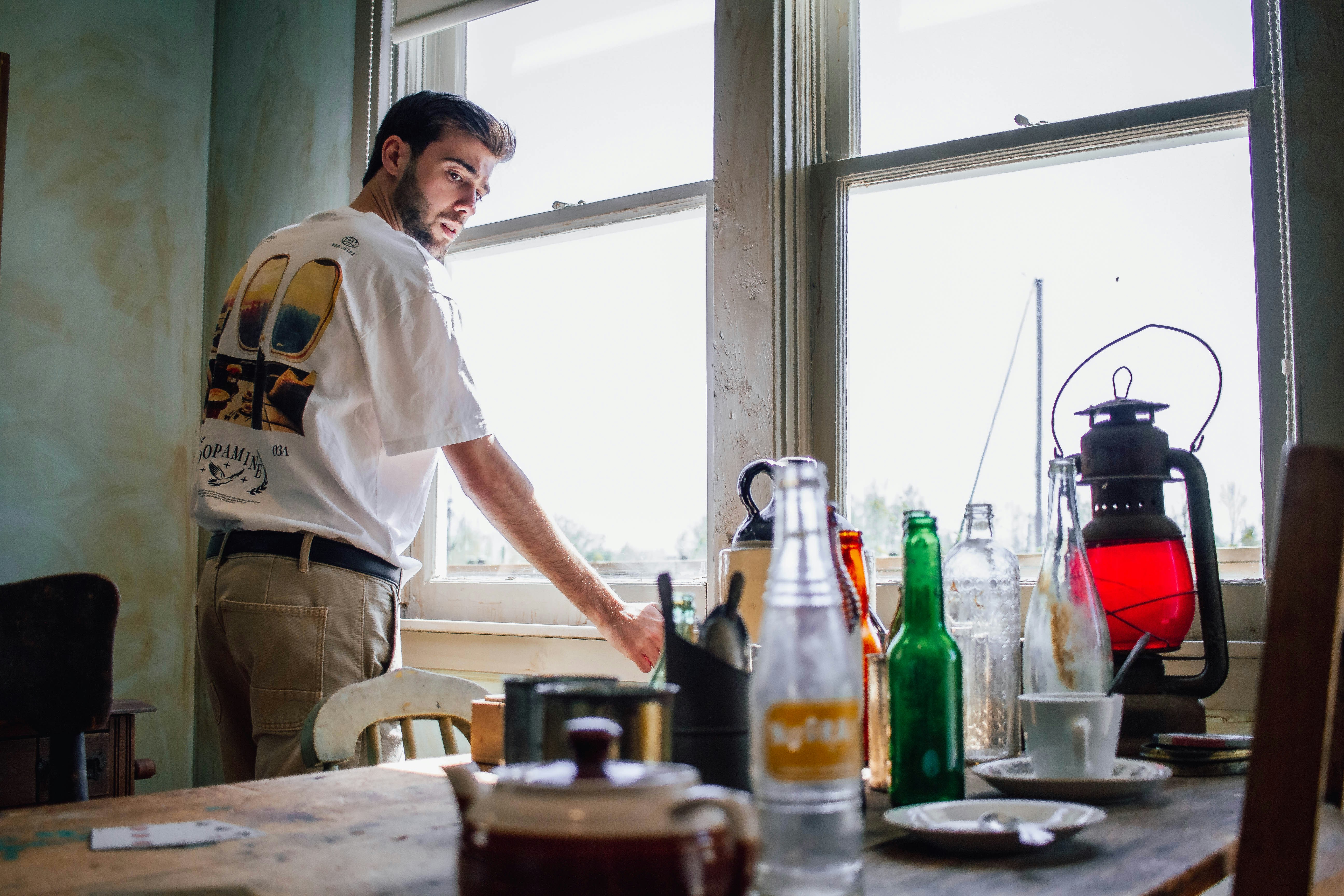 Workshopkeeper by the Window: A Quiet Morning in the Studio