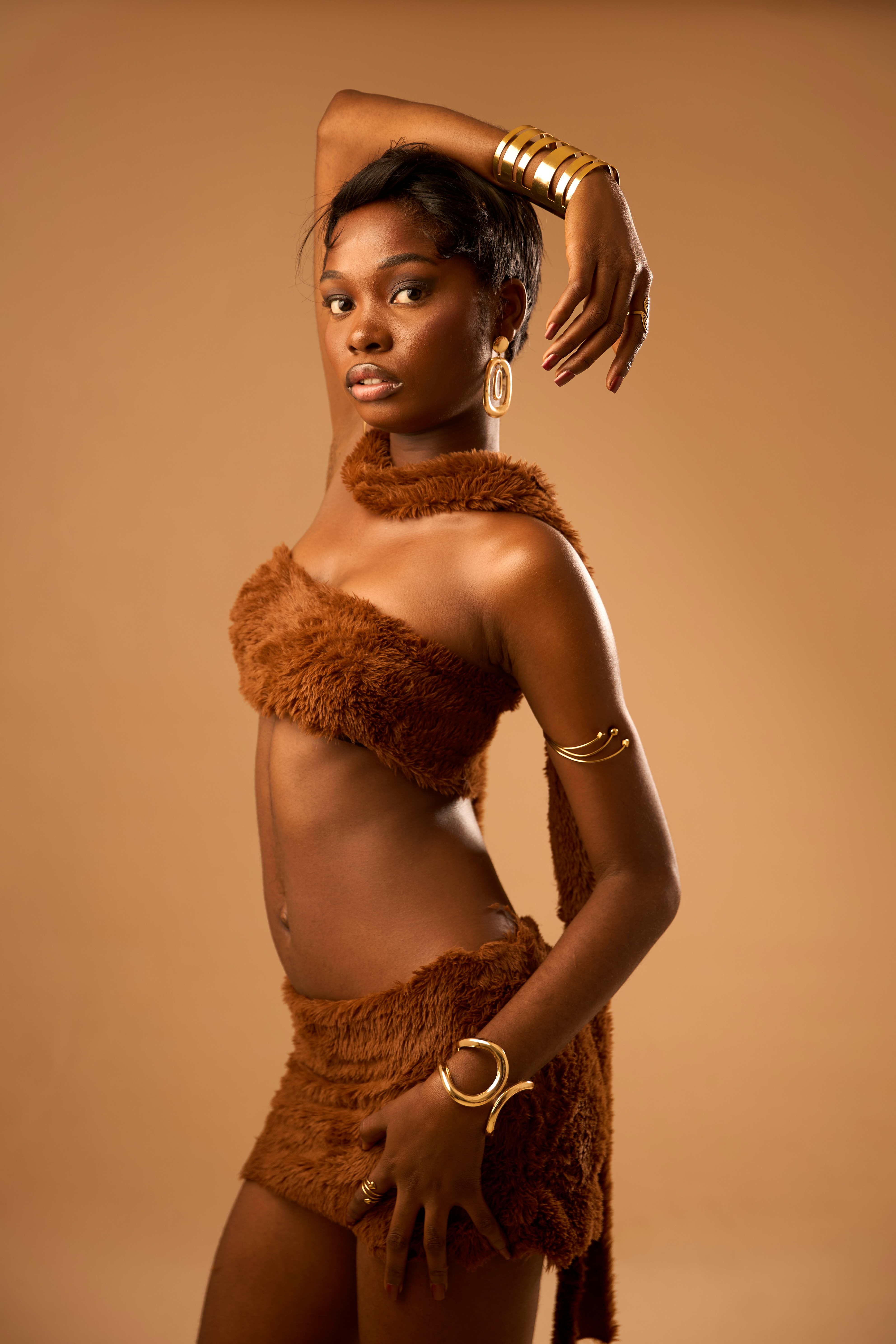 Golden Glow: A Dancer in Warm Velvet Tones
