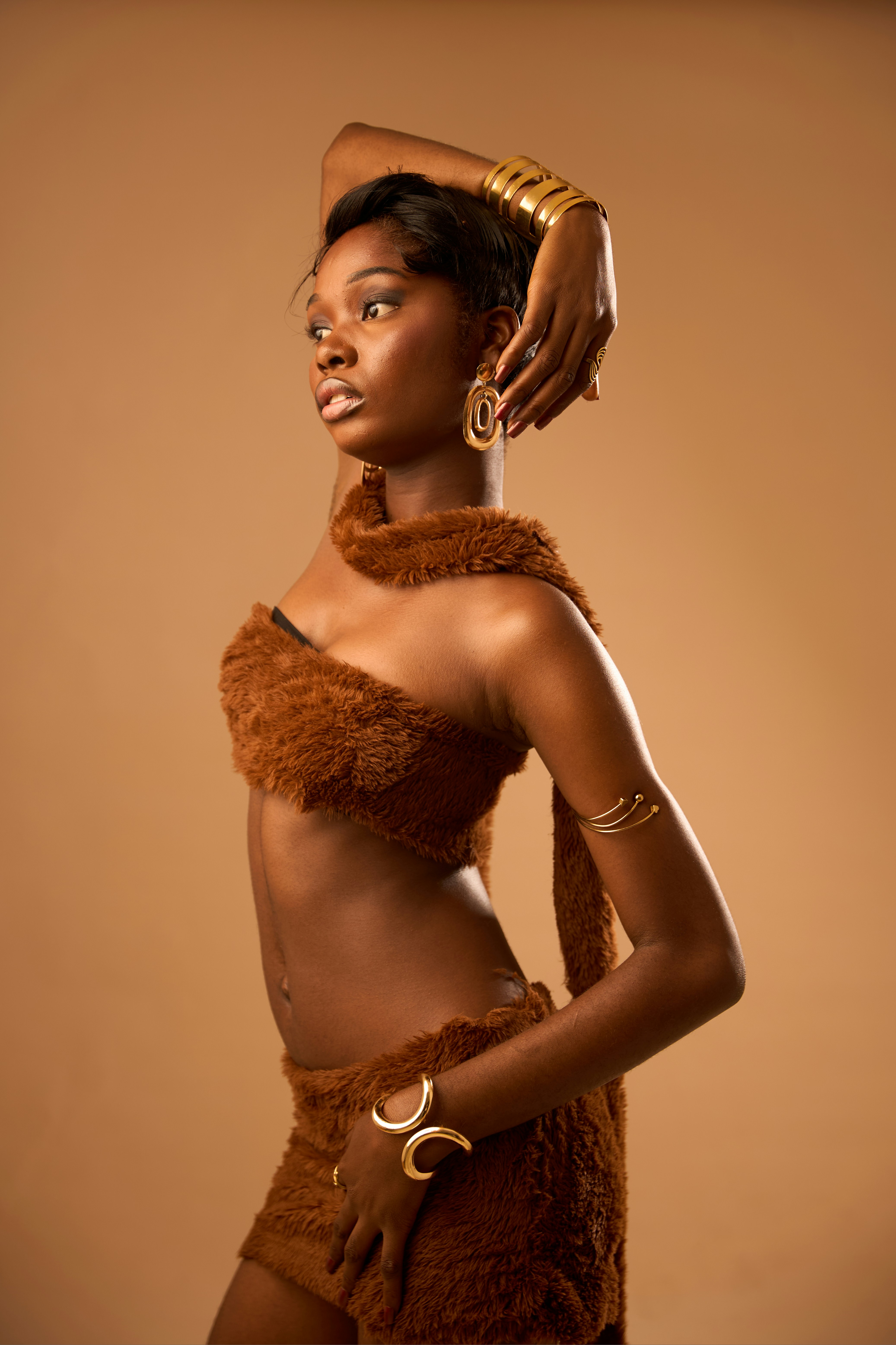 Copper Velvet: A Poised Portrait in Warm Amber