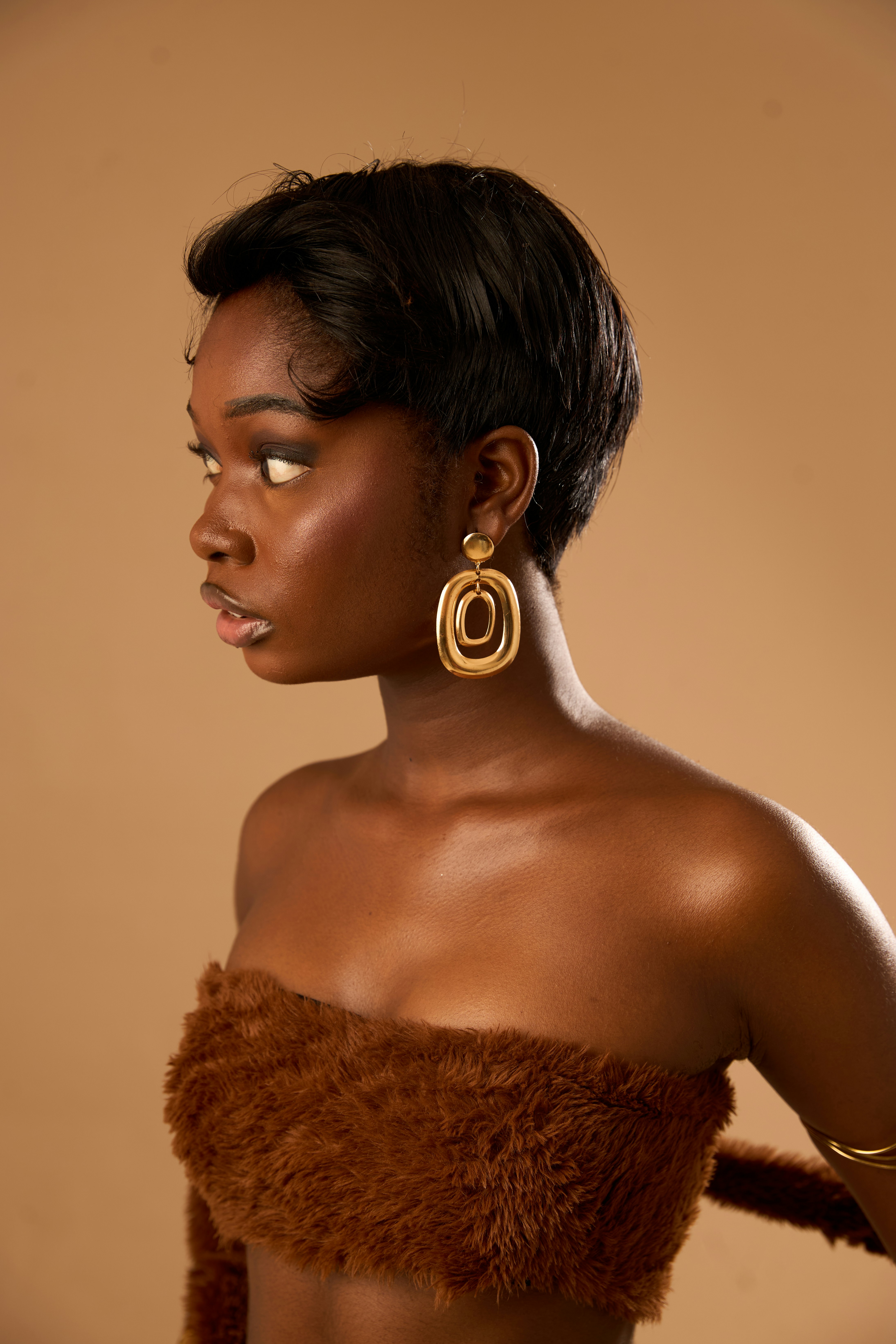 Golden Quiet: A Portrait of Light on Ceramic Skin